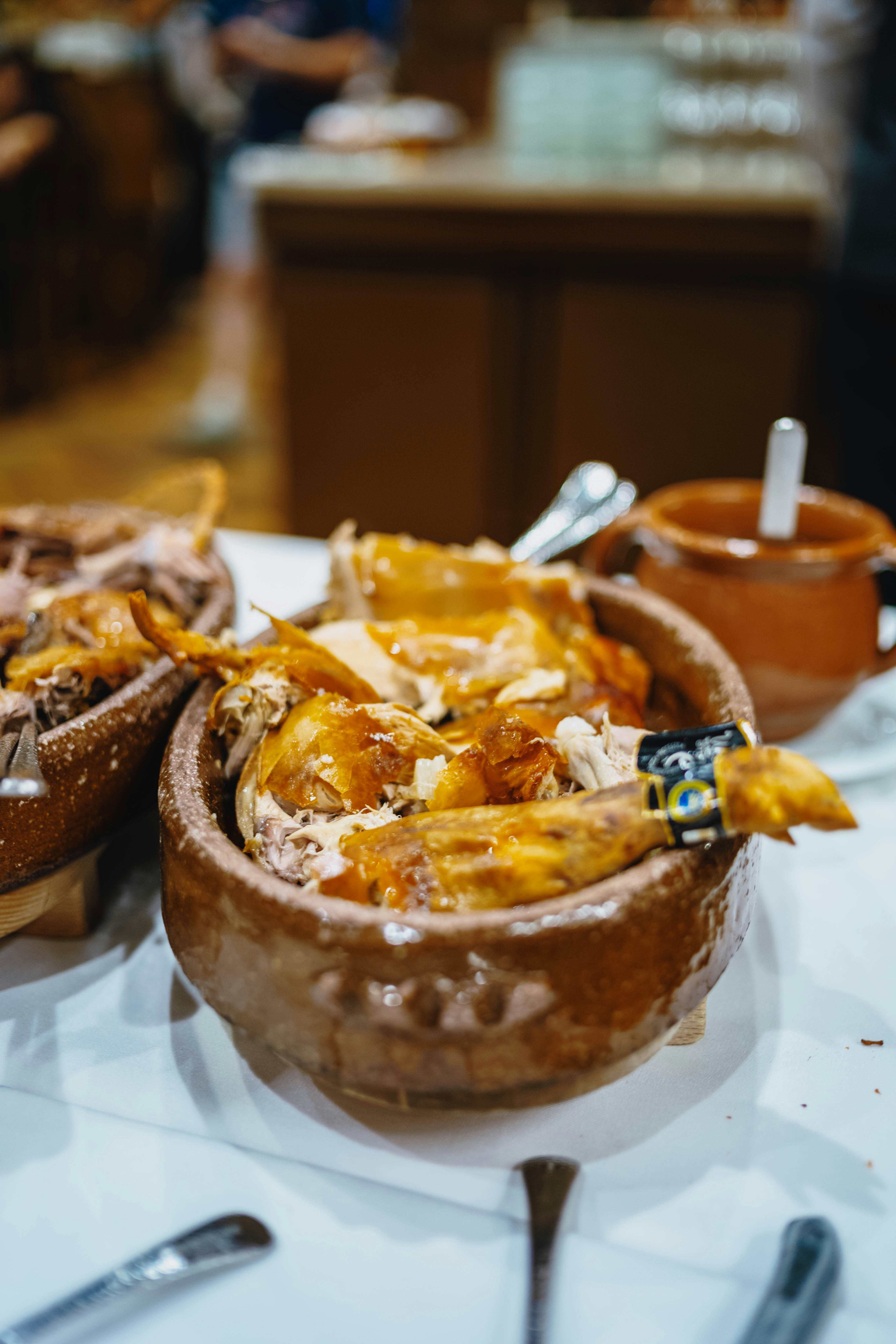 Clay Pottery Dessert Duo: A Hearth of Savory Treats on a Table