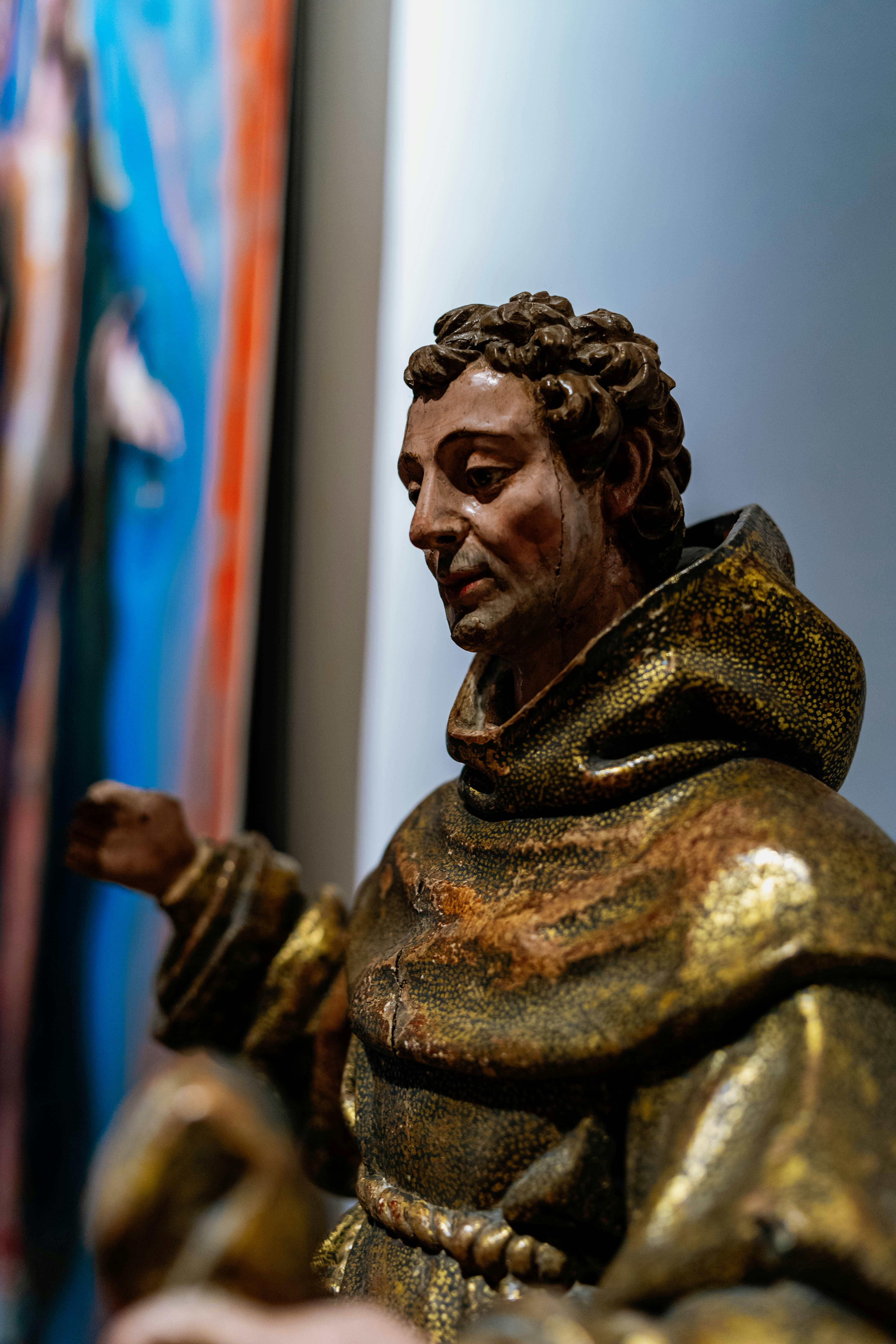 Bust of a Saintly Monk in Museum Shadow