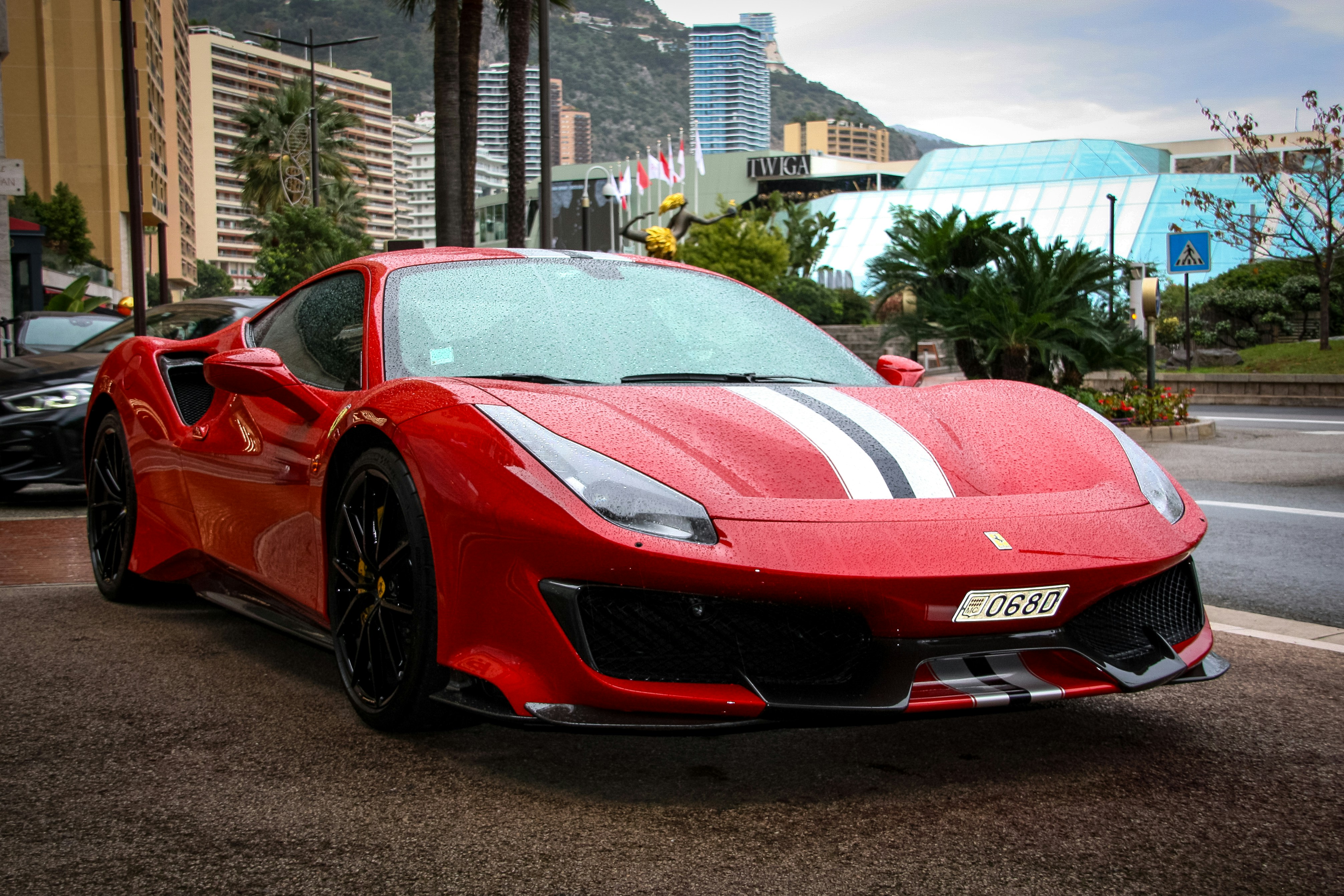 Scarlet Viper: a red Ferrari awaiting the curbside spotlight