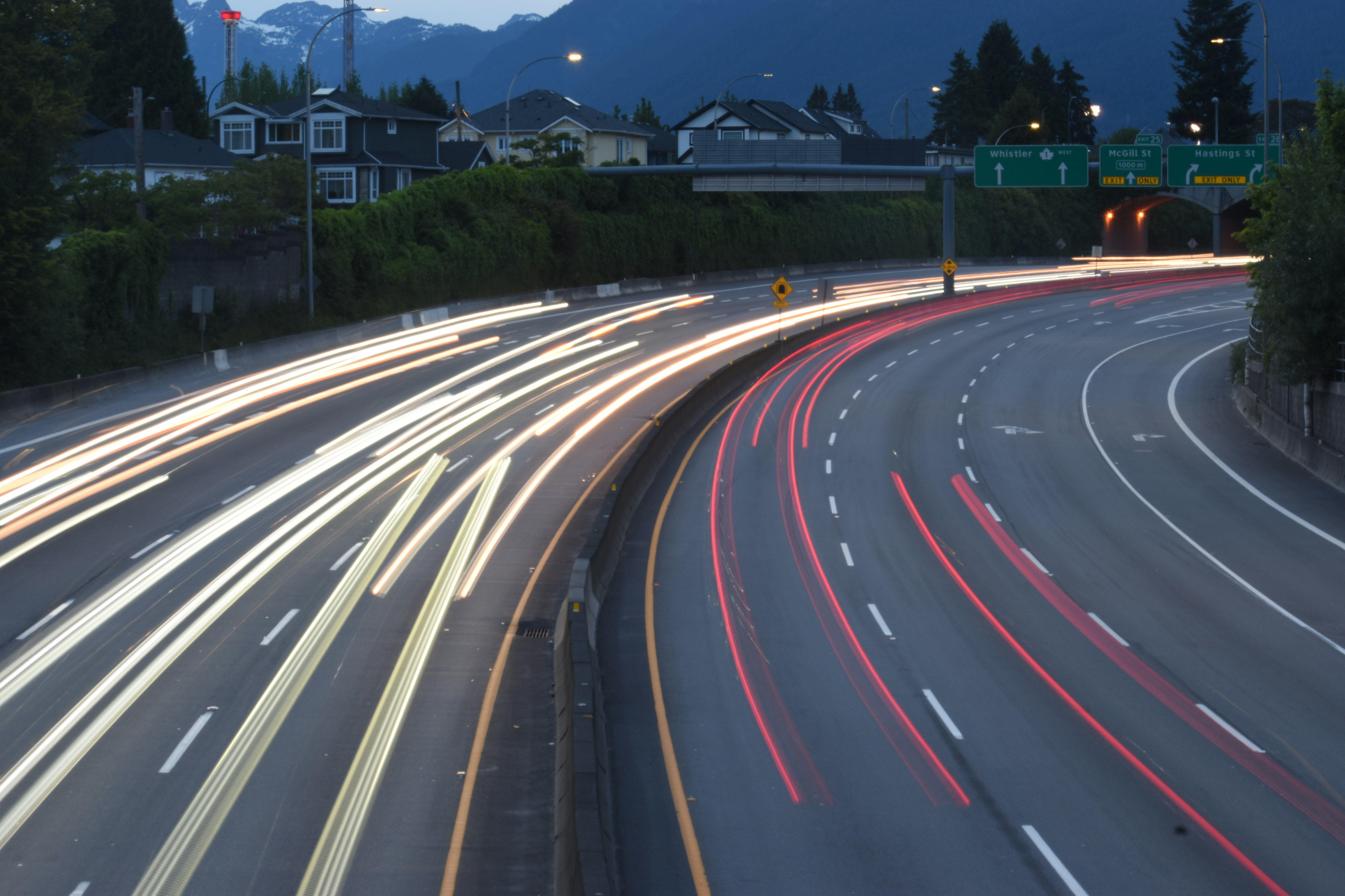 Bright Arcs Over a Midnight Freeway