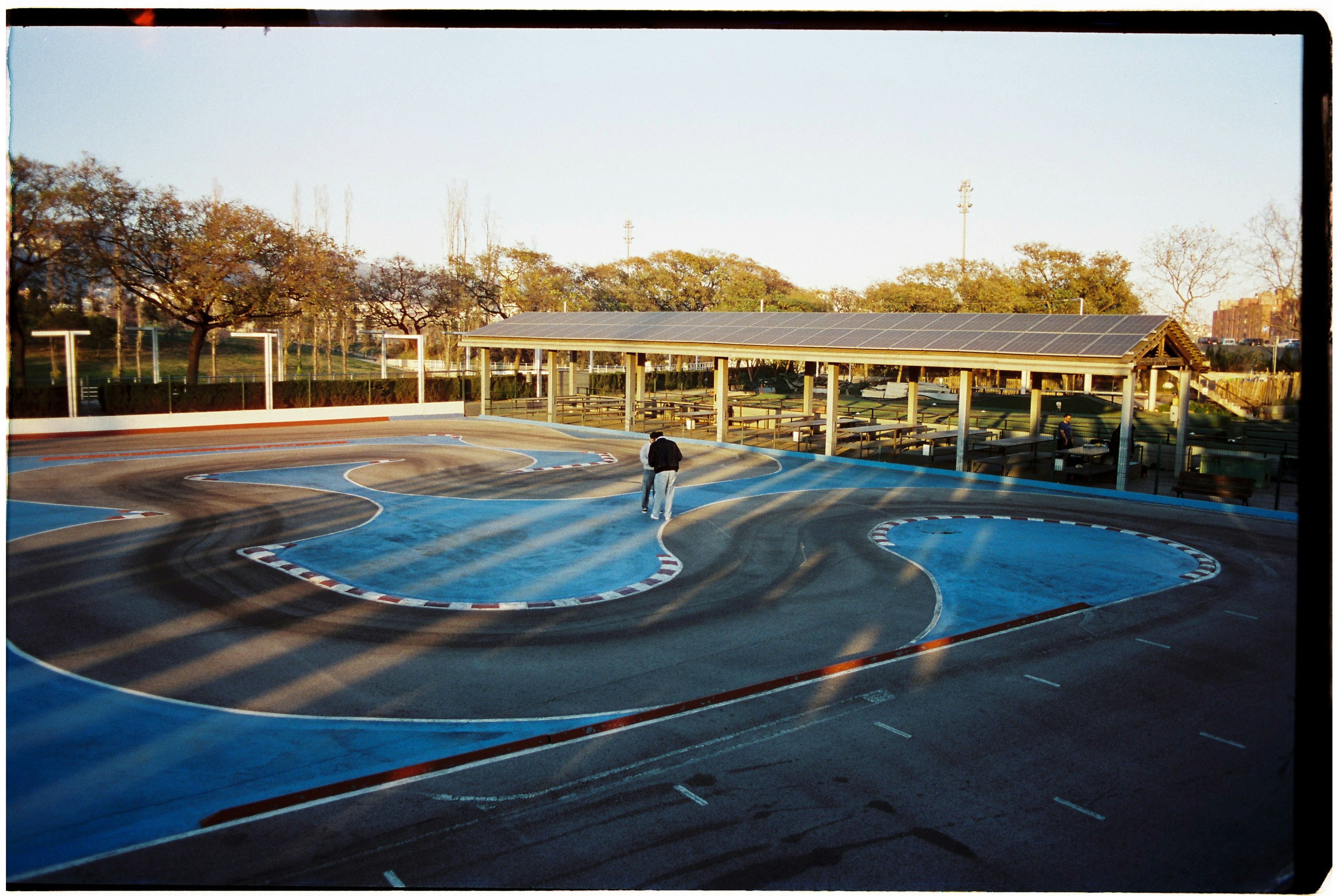 Skatepark Quiet: A lone rider Circles the Blue Concrete