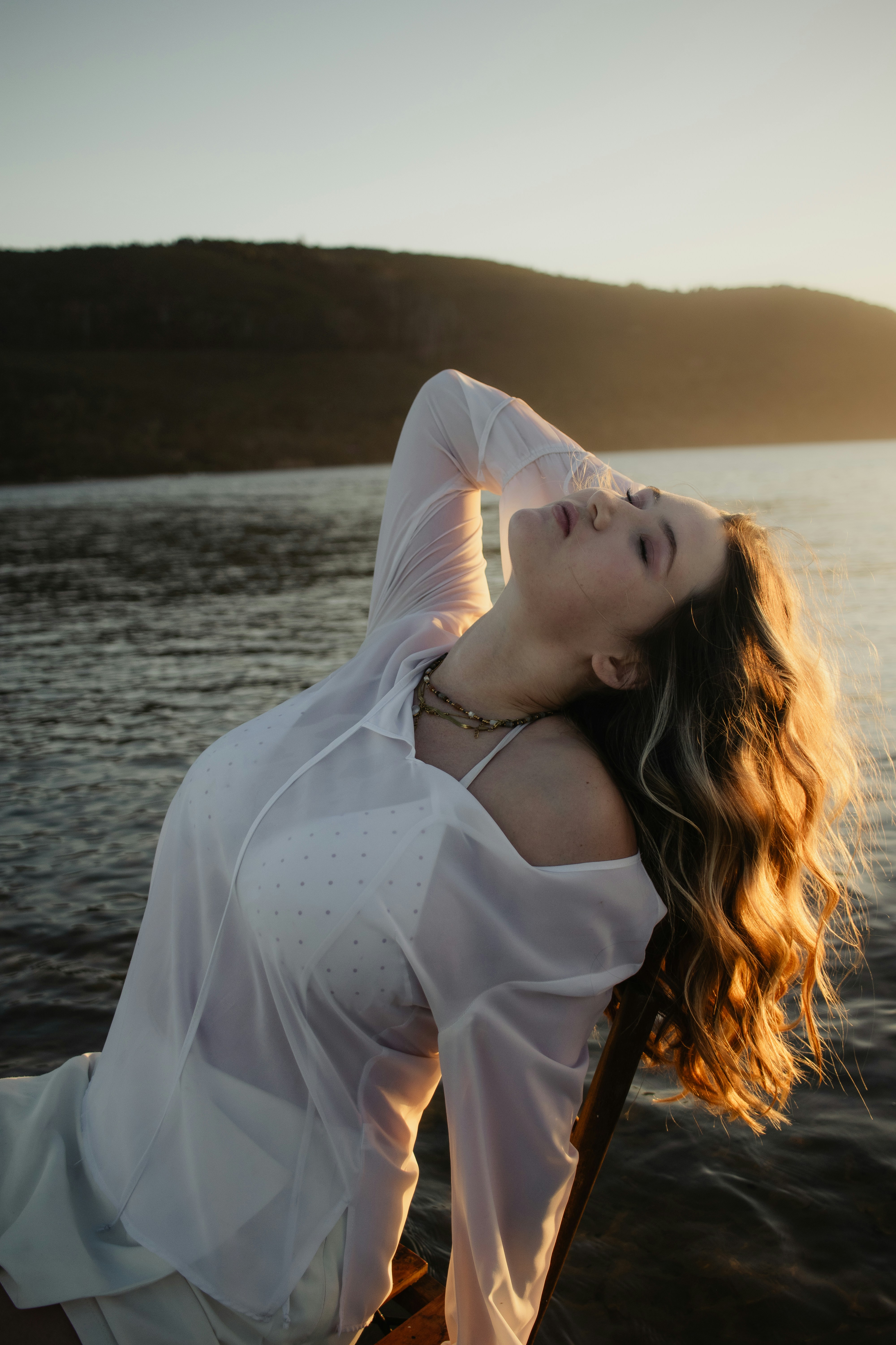 Sunset Reverie: A Portrait of Calm by the Water