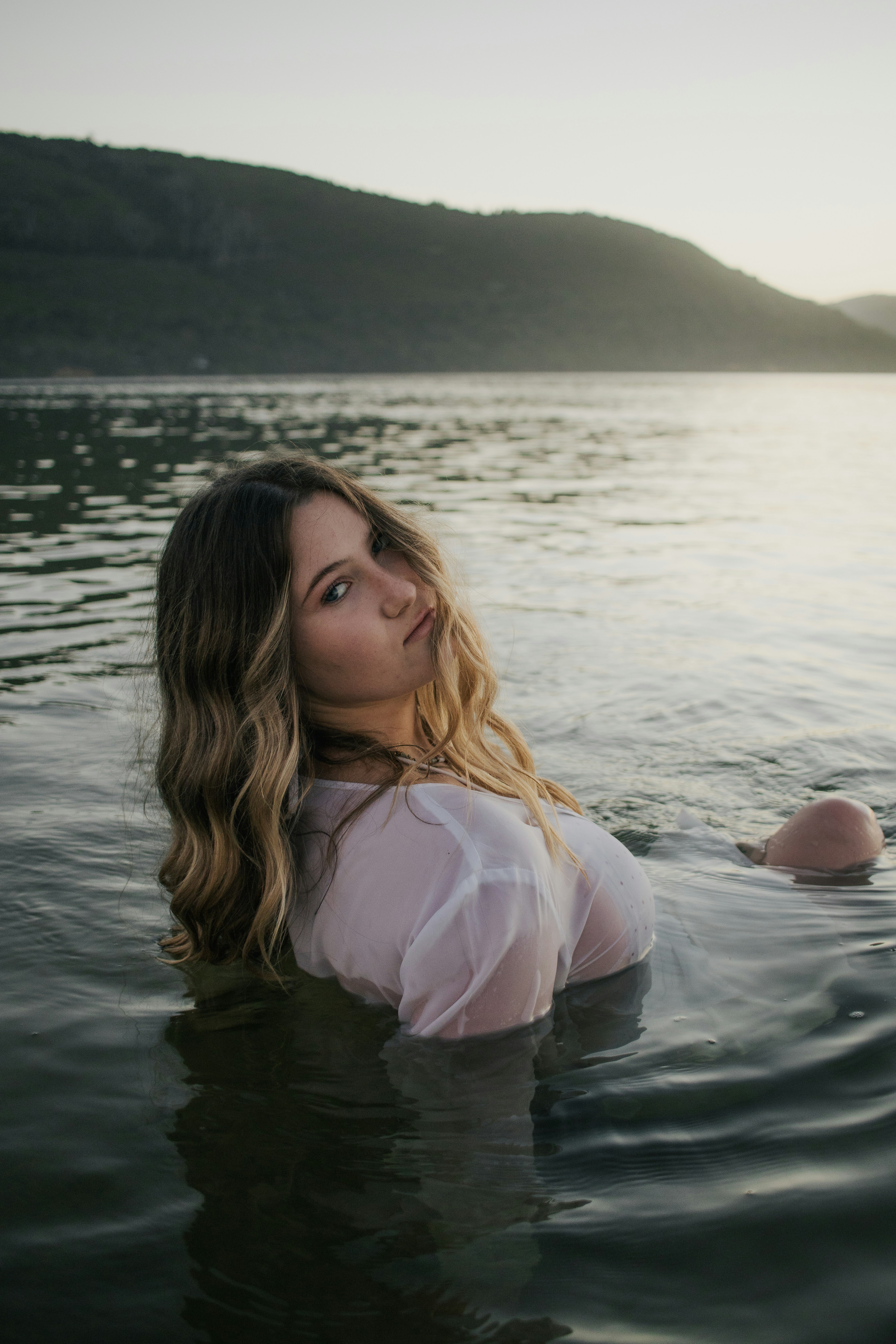 Emergence from the Quiet River: A Portrait at Dusk
