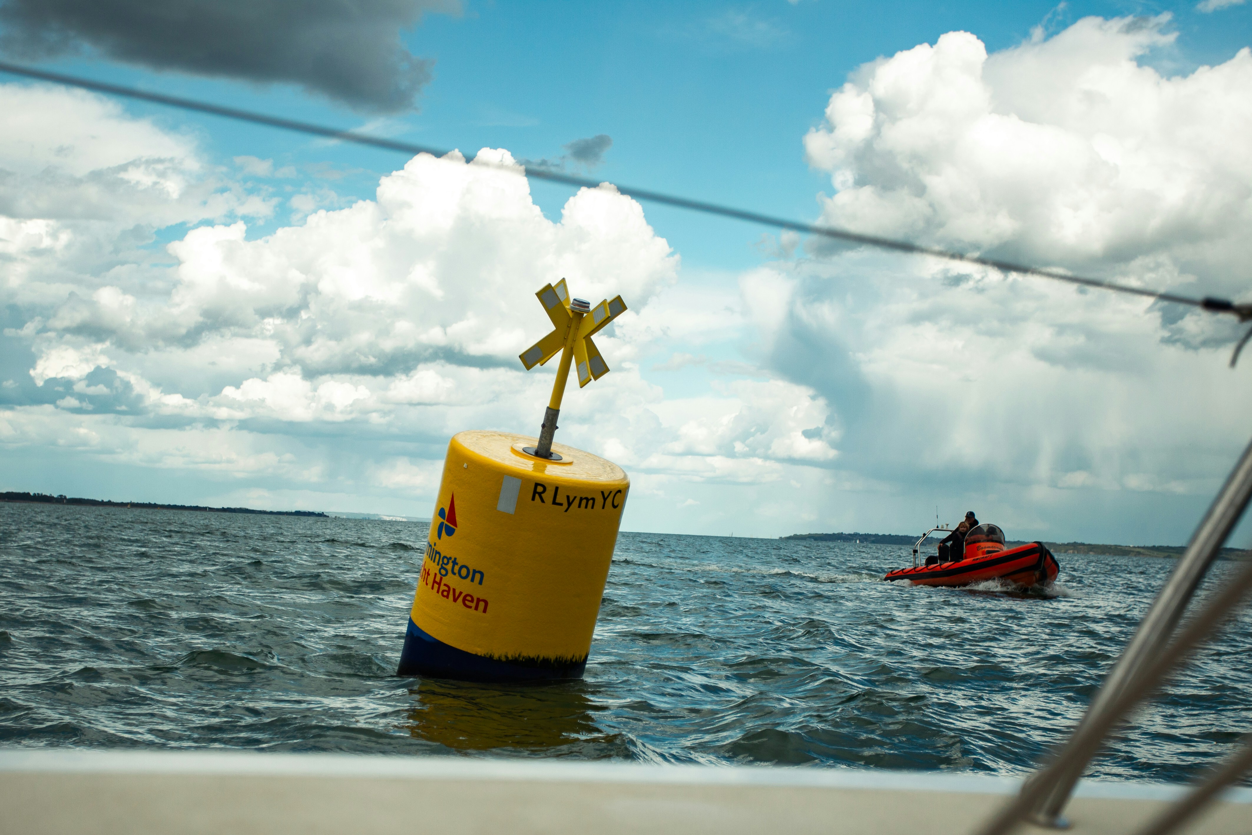 Yellow Buoy Sentinel: A Sail into Open Water