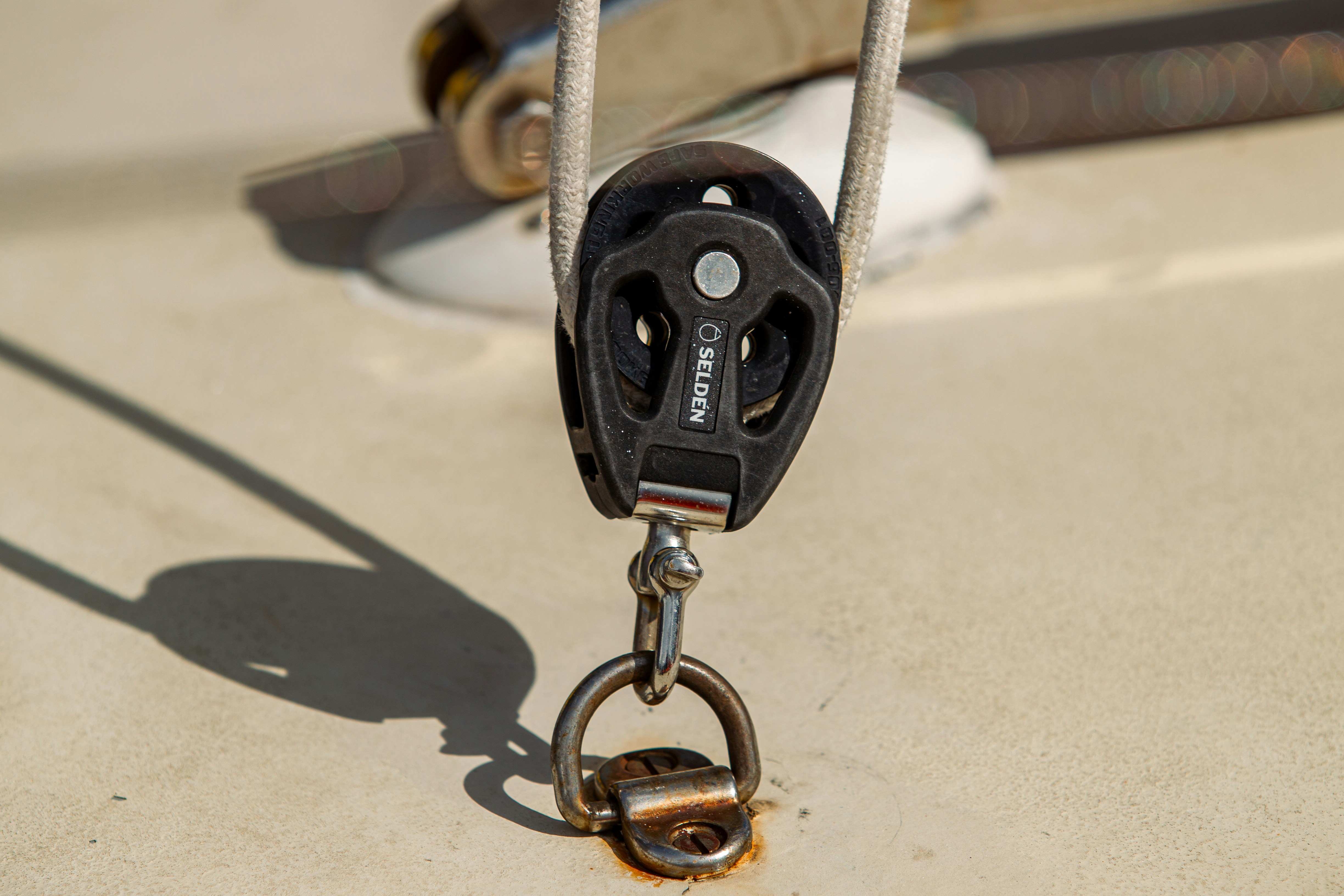 Anchored Focus: The Pin and Rope Tale on a Sunlit Deck