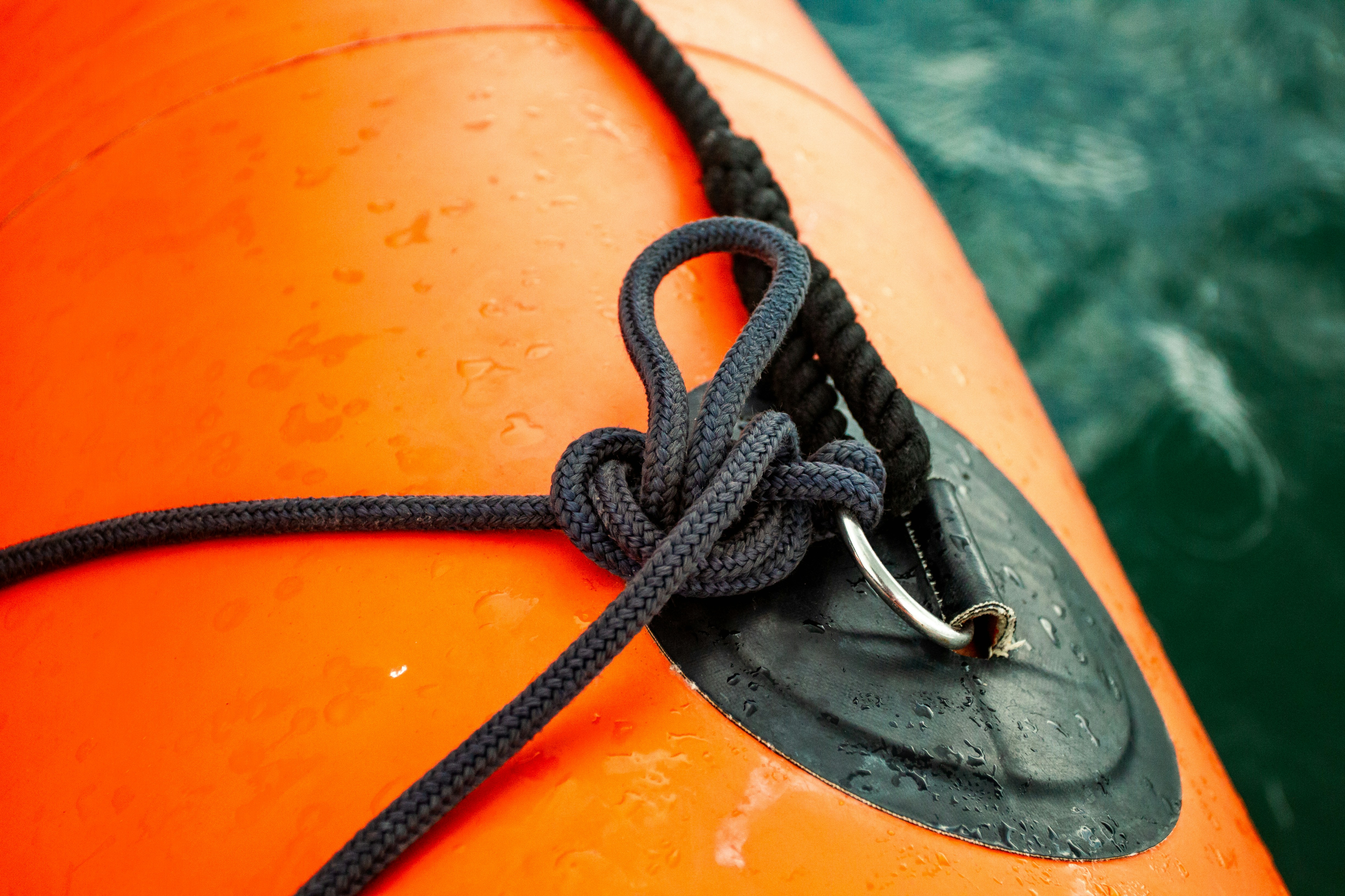 Tethered Orange: A Knot in the Sea of Blue