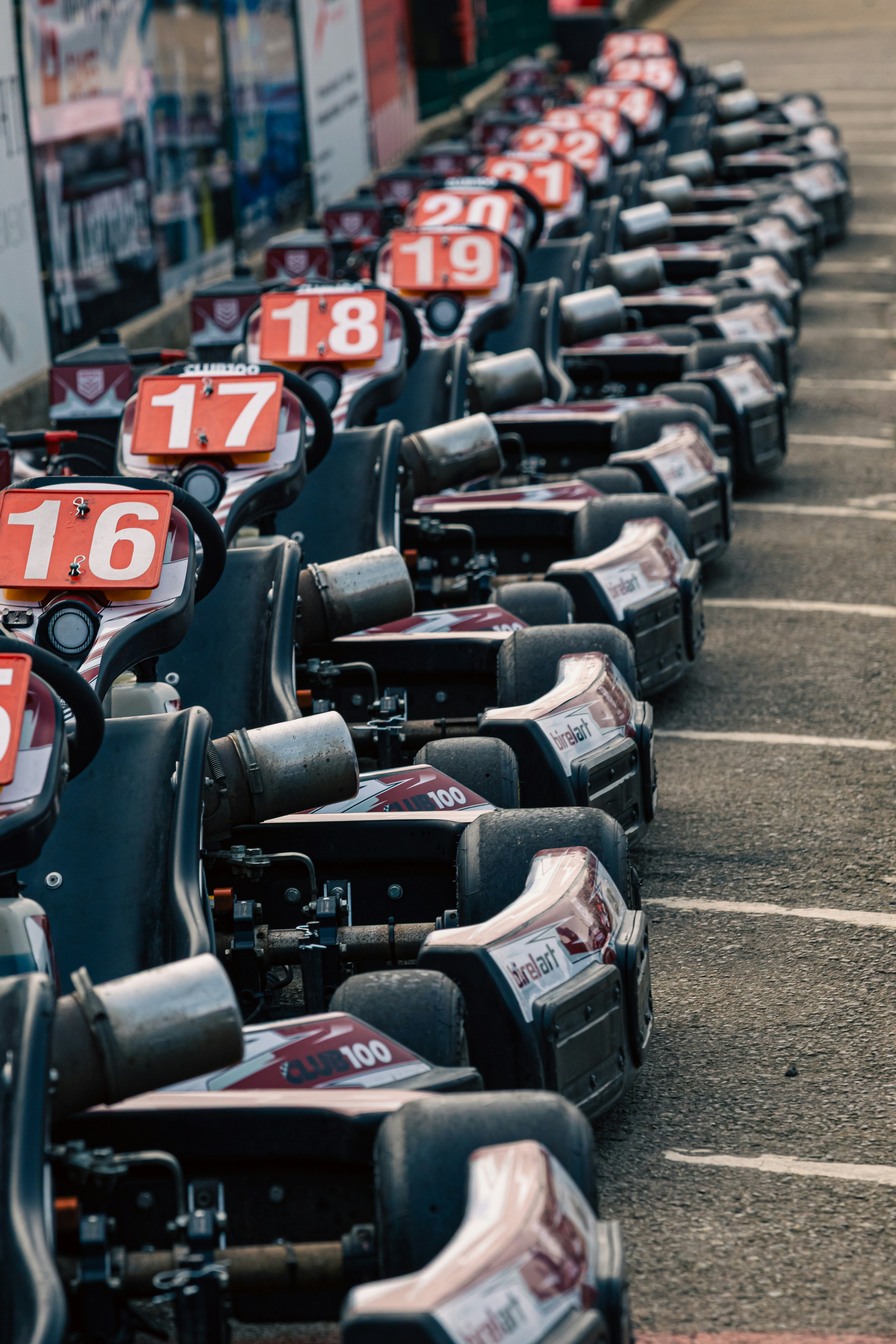 Row of numbered go-karts Ready for the Track
