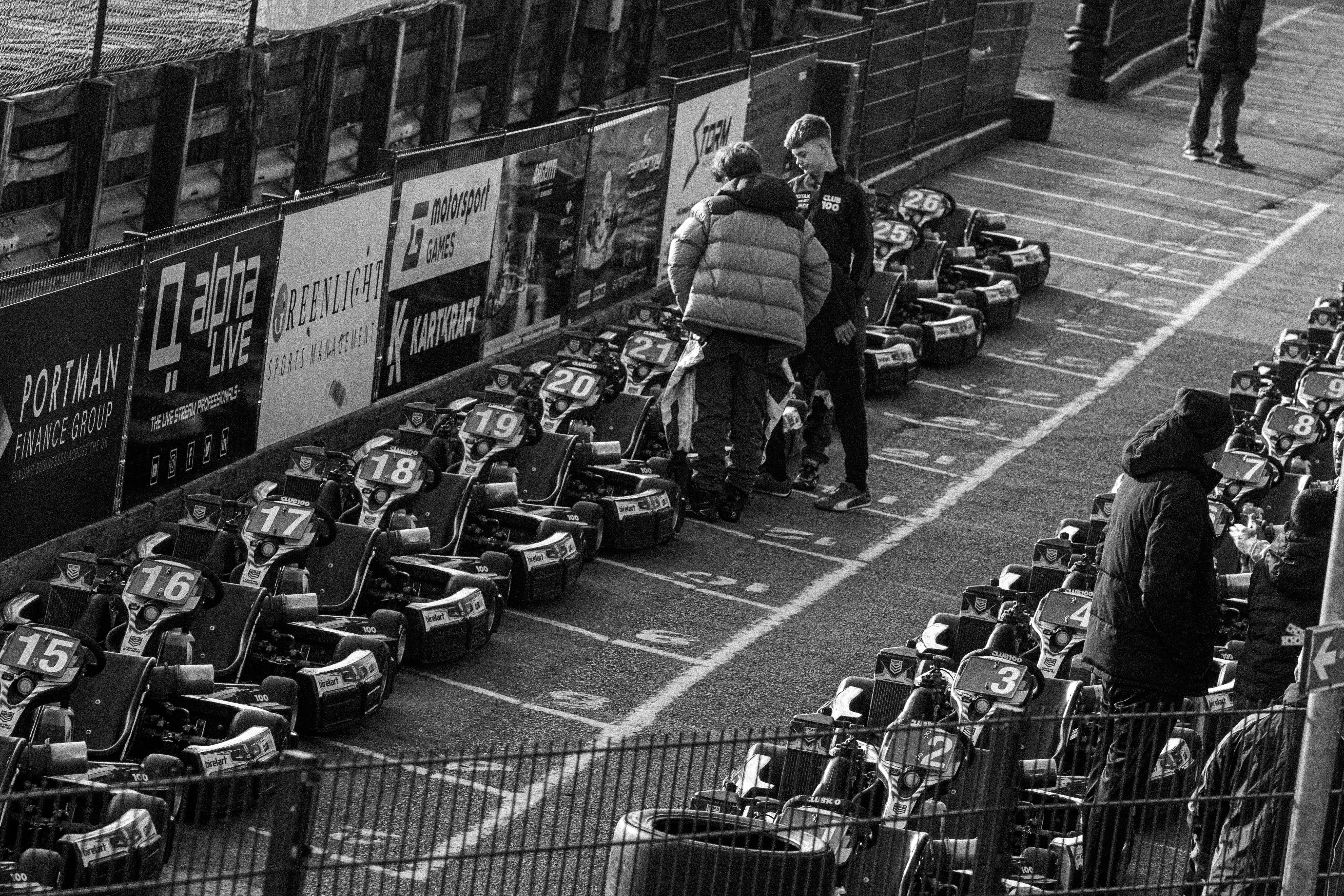 Gridiron of Gears: A Quiet Moment at the Go-Kart Line
