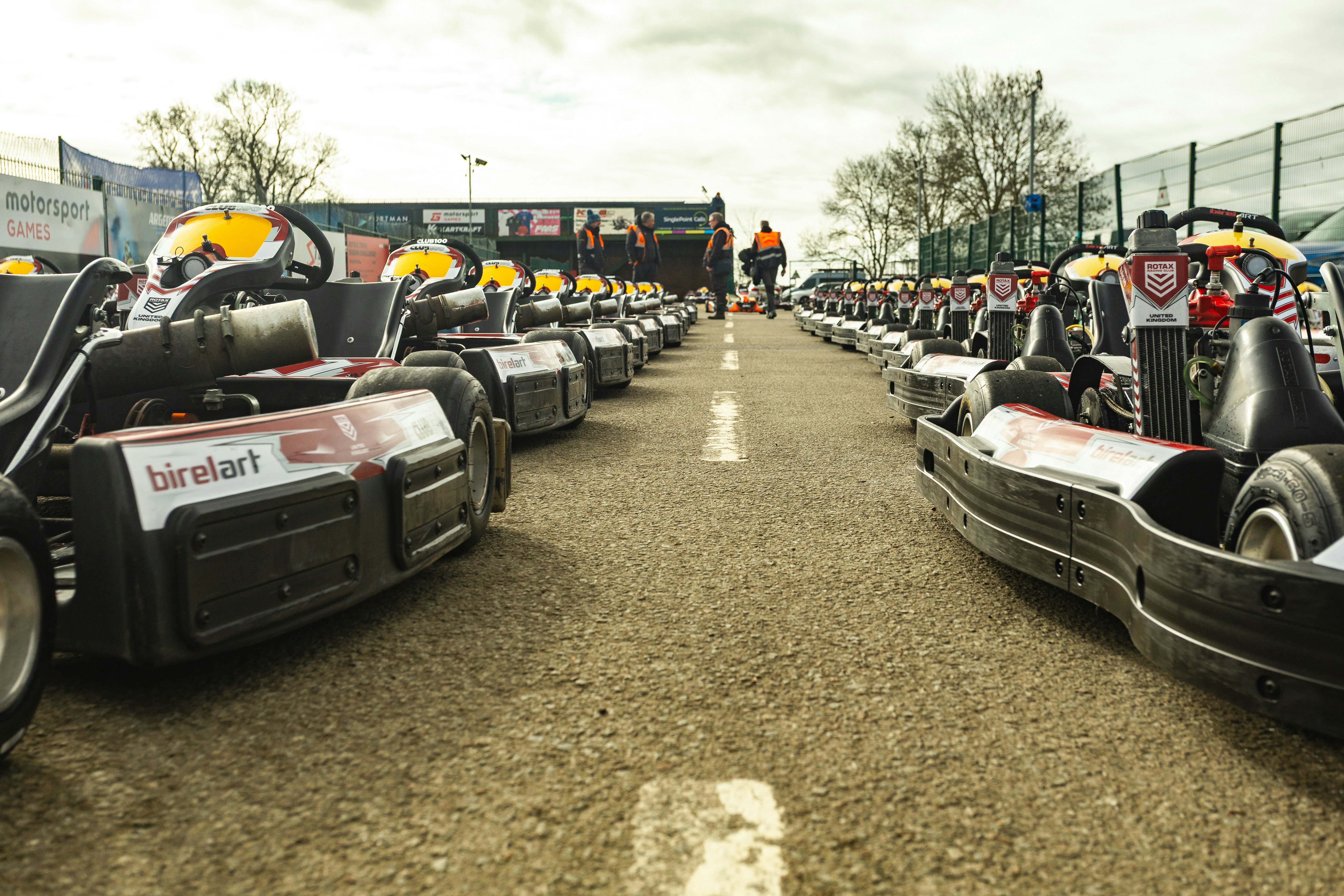 Starting Line Symmetry: A Race of Karts Packed for the Next Lap