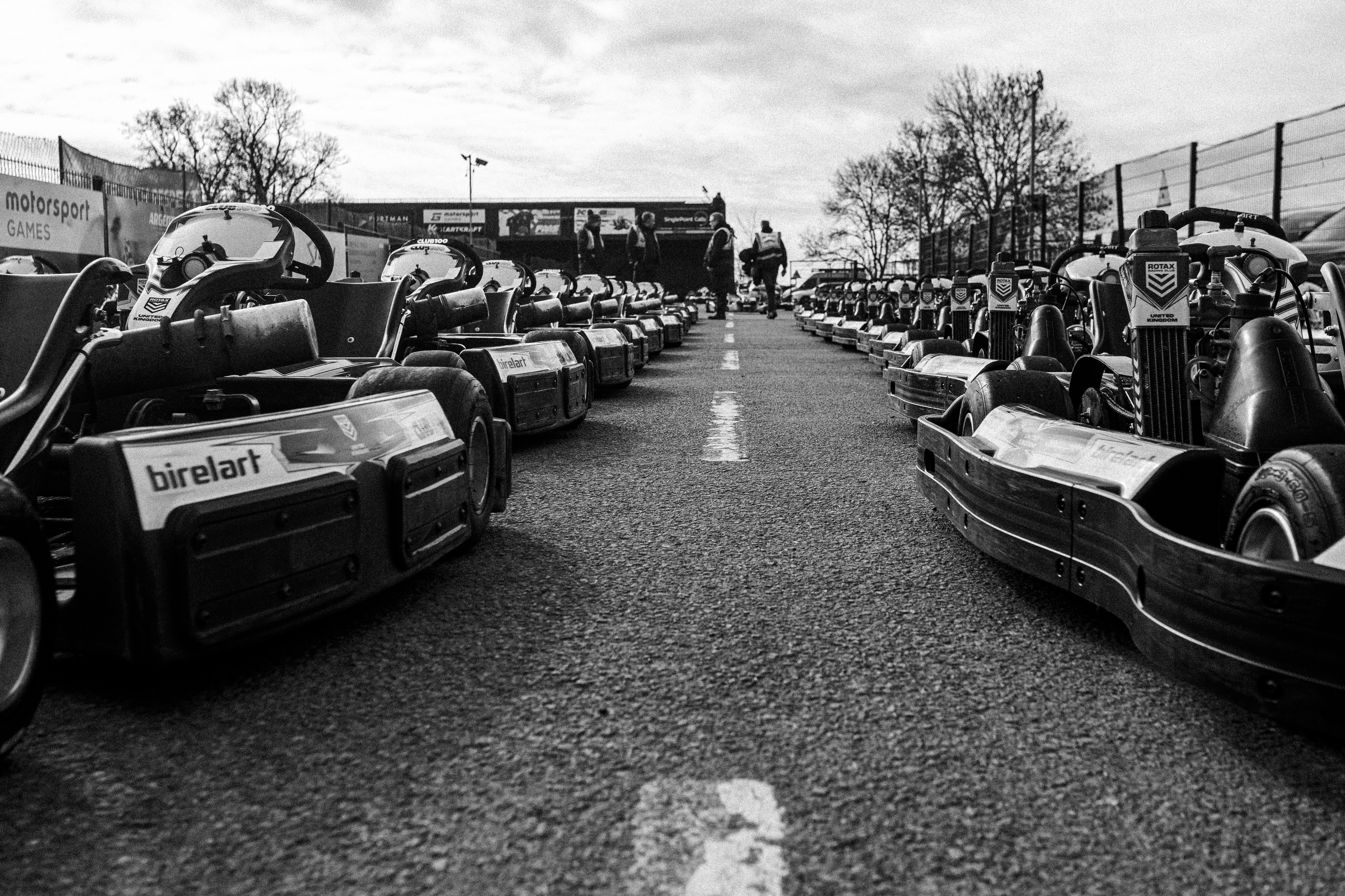 Center Lane: A Silent Row of Go-Karts Await the Next Race