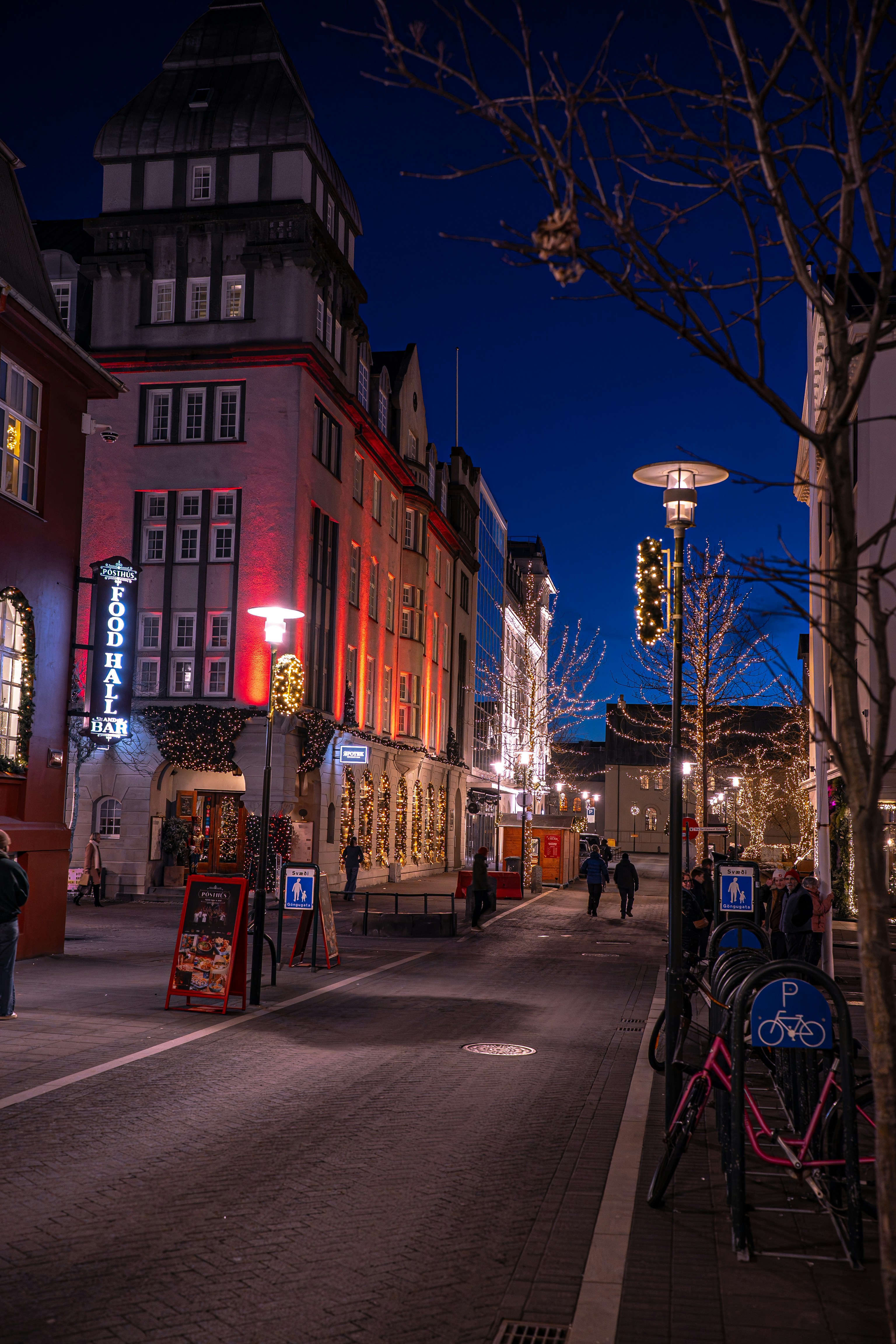 Night Street Waltz: Festive Lights Along a Historic Lane