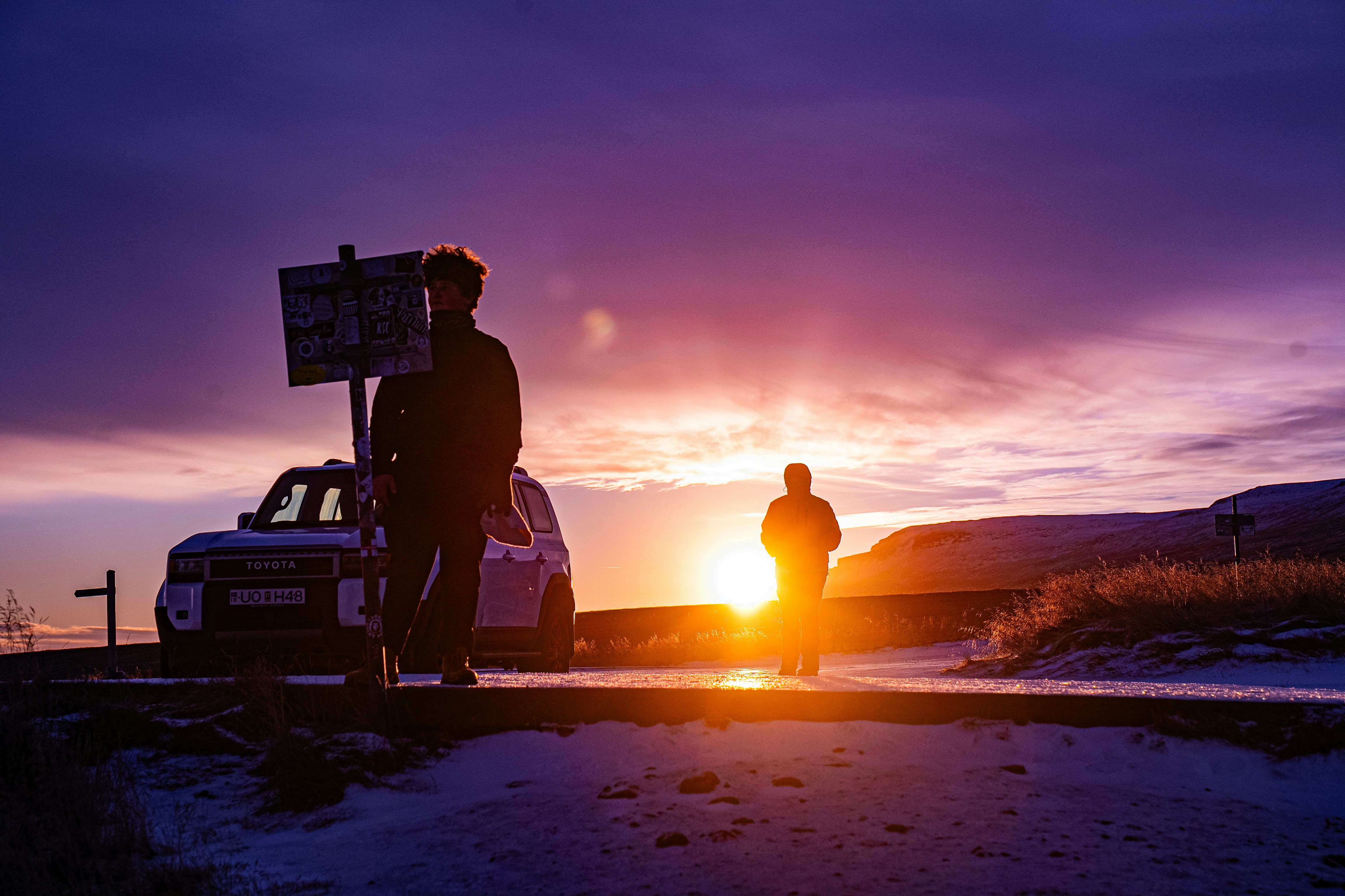 Sunset Stop: Silhouettes by the Dimming Road
