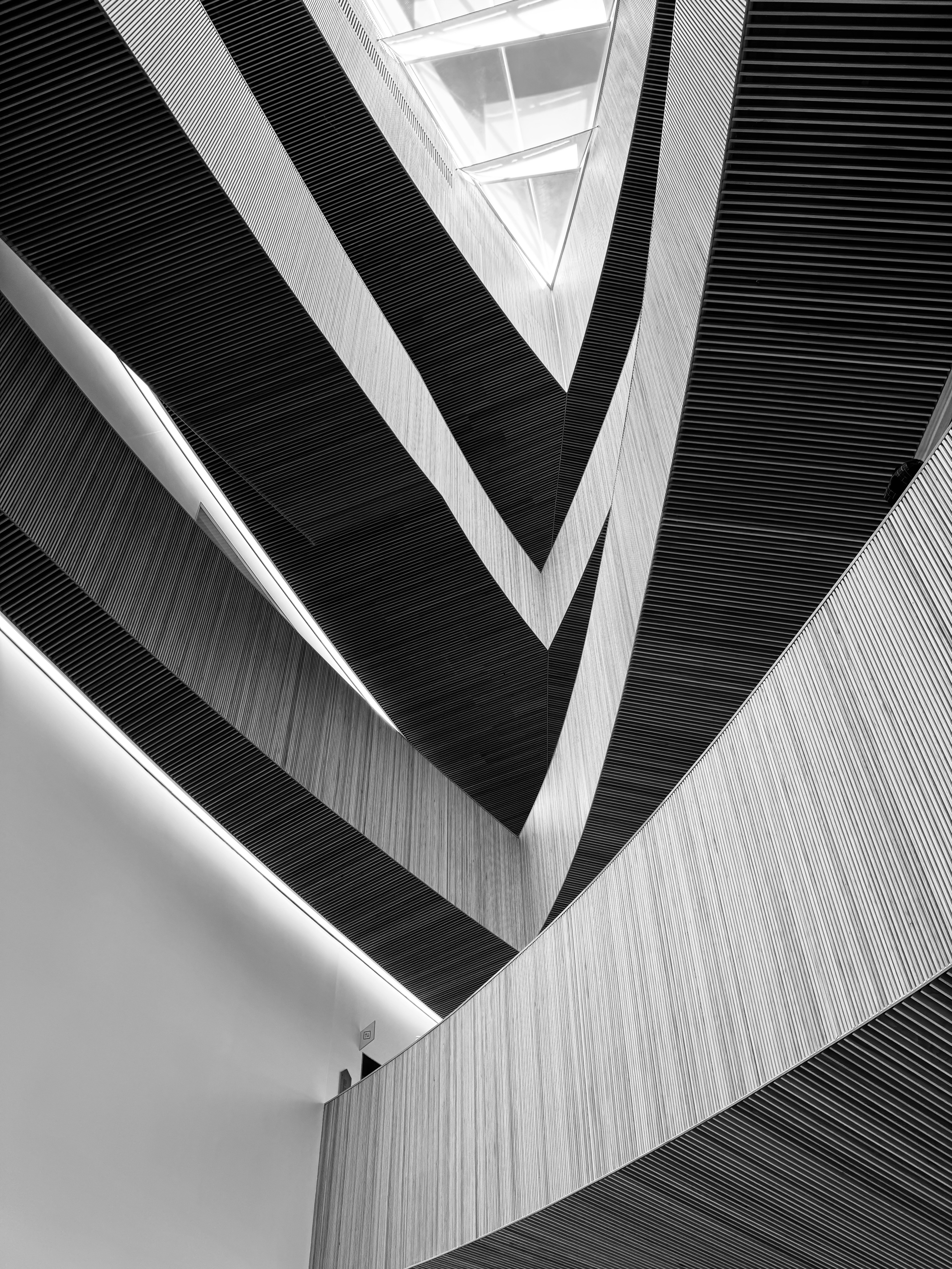 Architectural Spiral: Monochrome Atrium Convergence