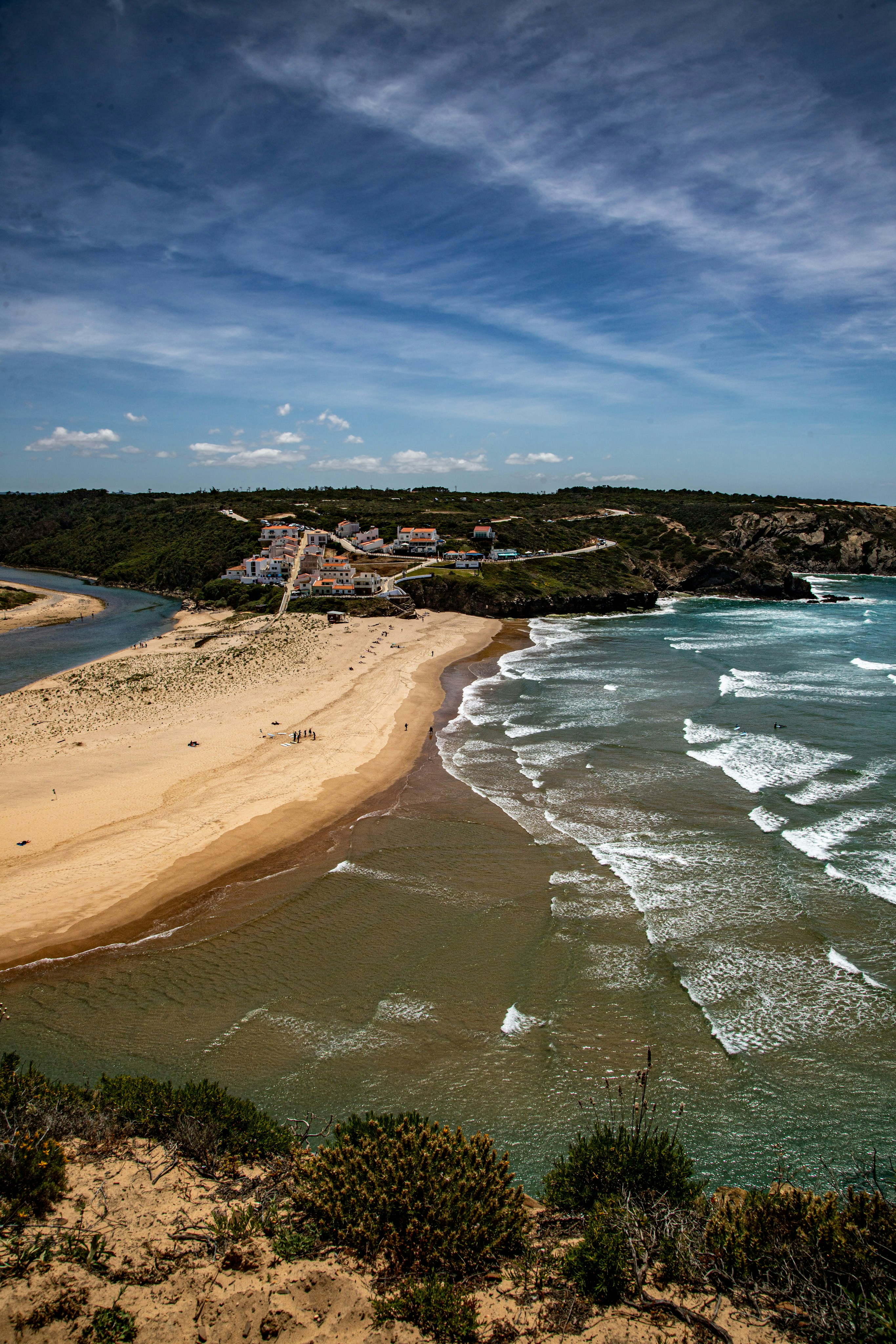 Coastal Village Nestled Along a Golden Beach