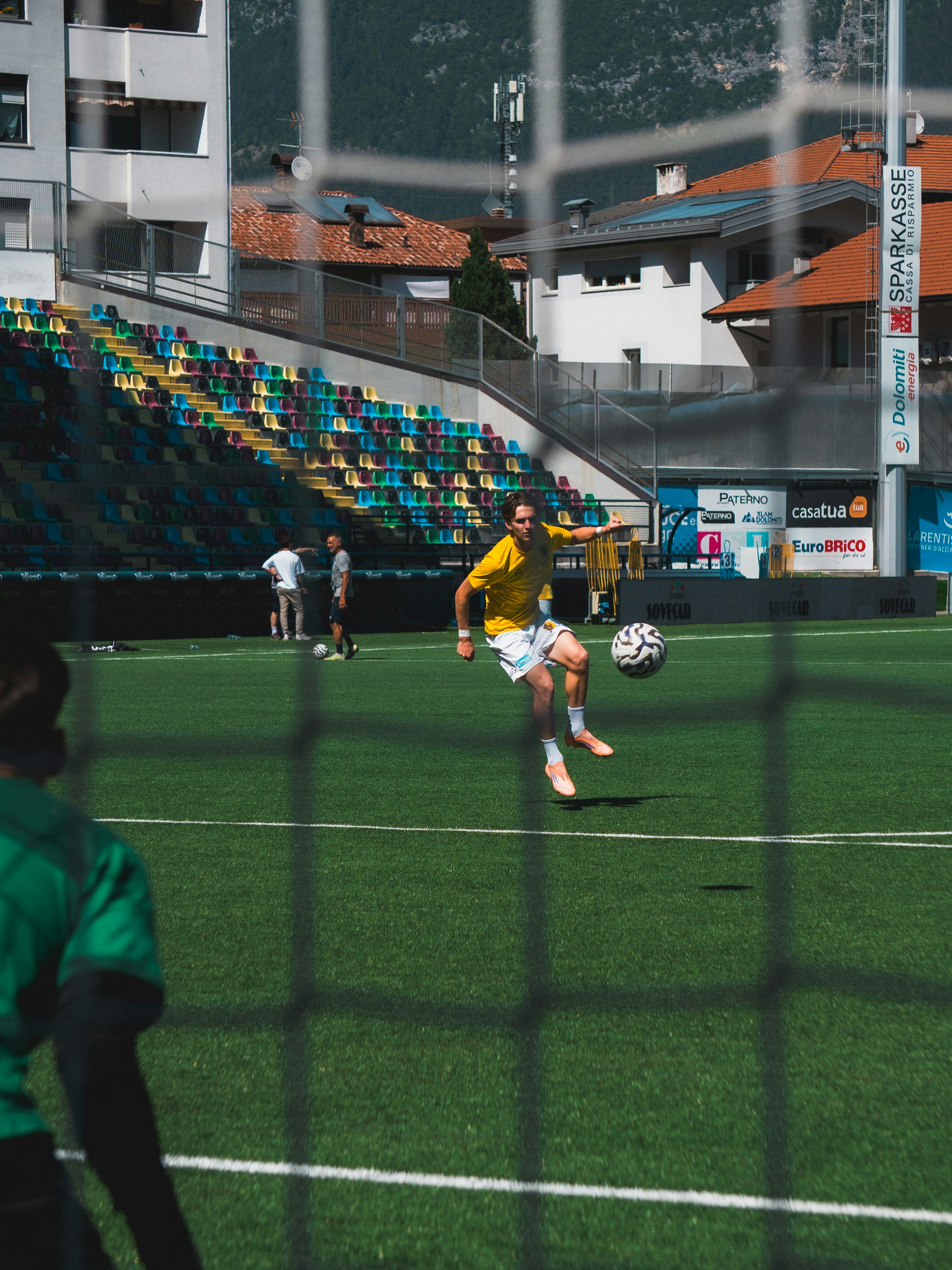 Goalkeeper of the Midfield Meadow: A Candid Strike on the Sunny Pitch