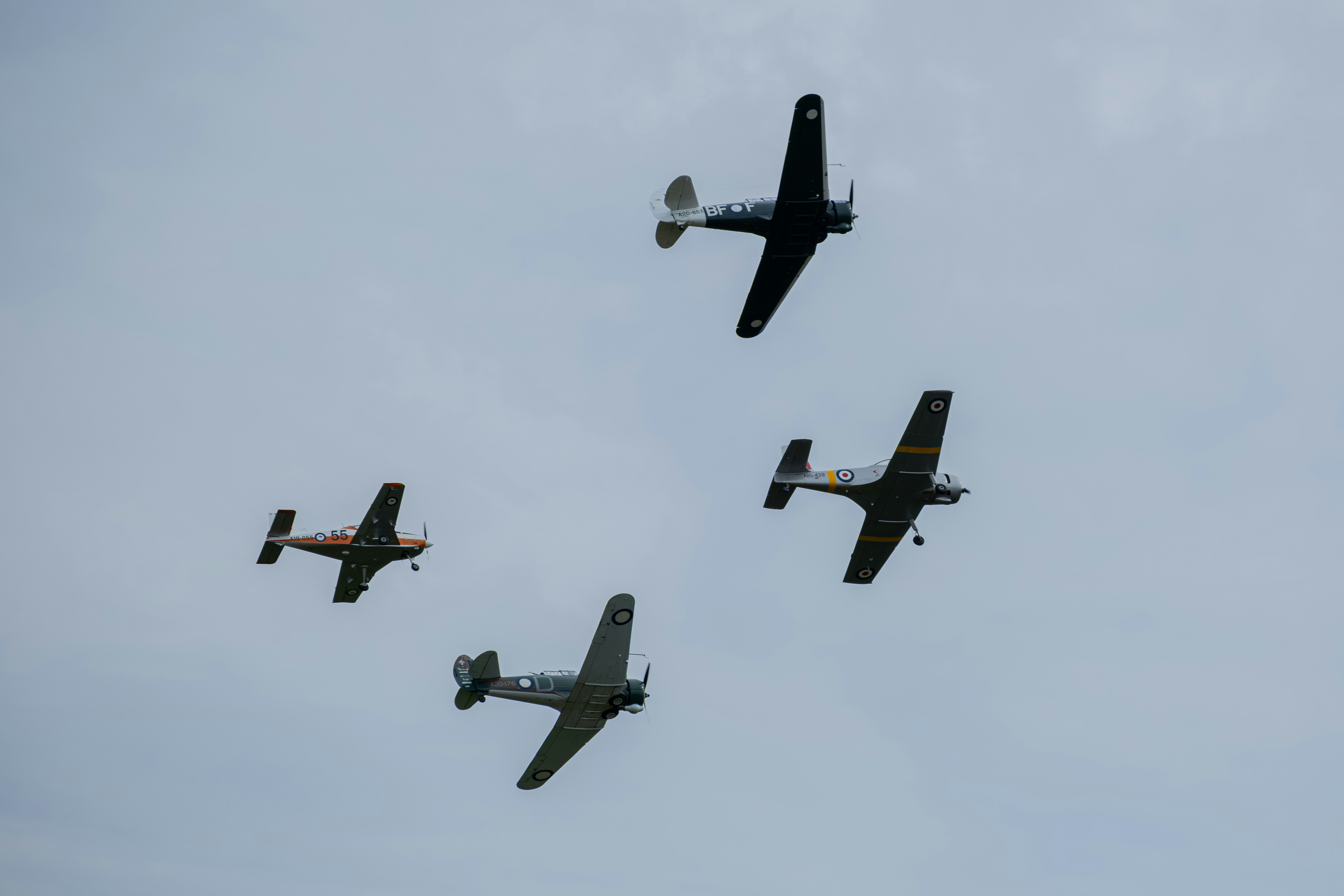 Formation in the Sky: A Quartet of Vintage Planes in Open Cloud