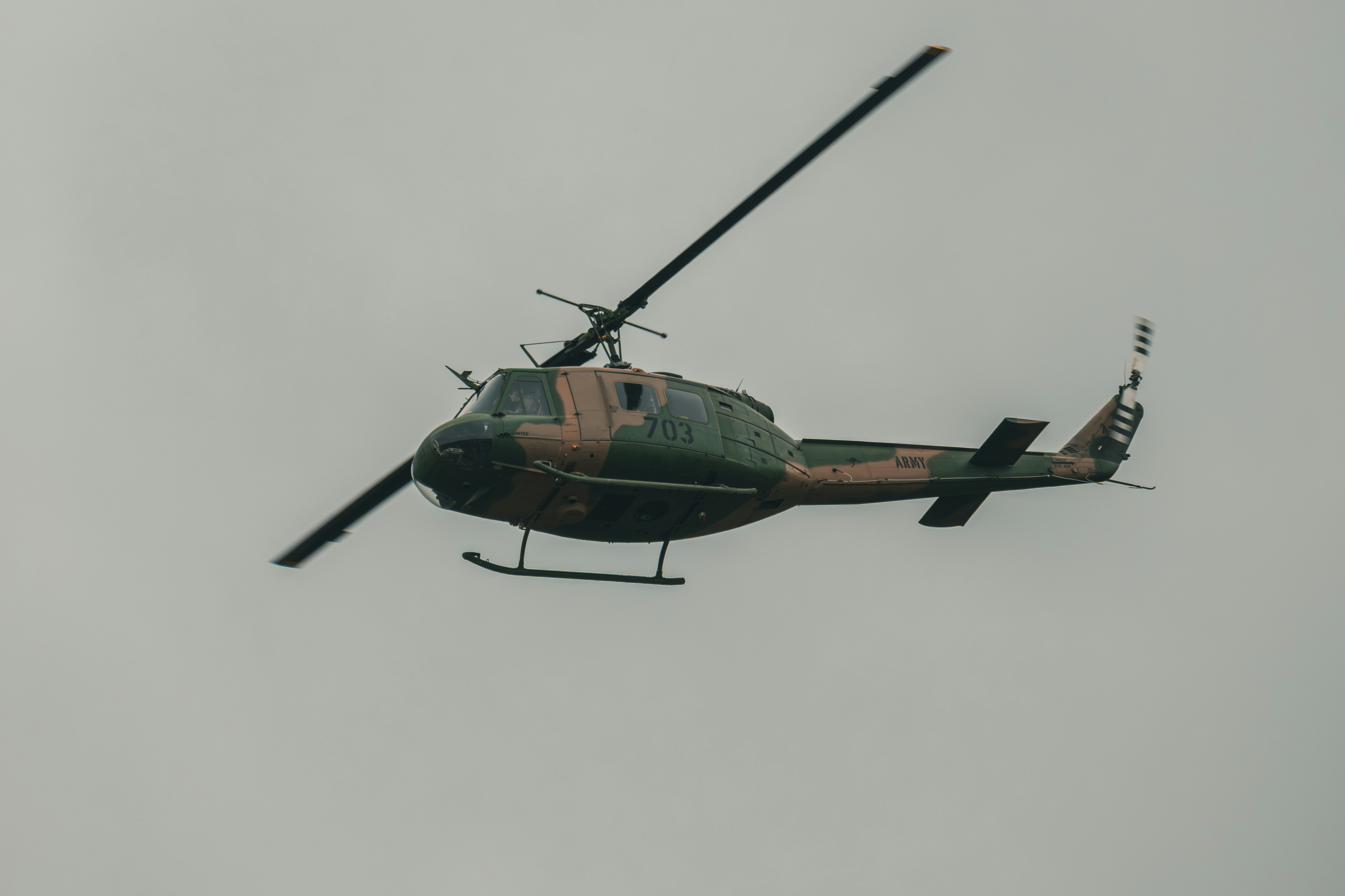 Desert Camouflage Helicopter in Flight