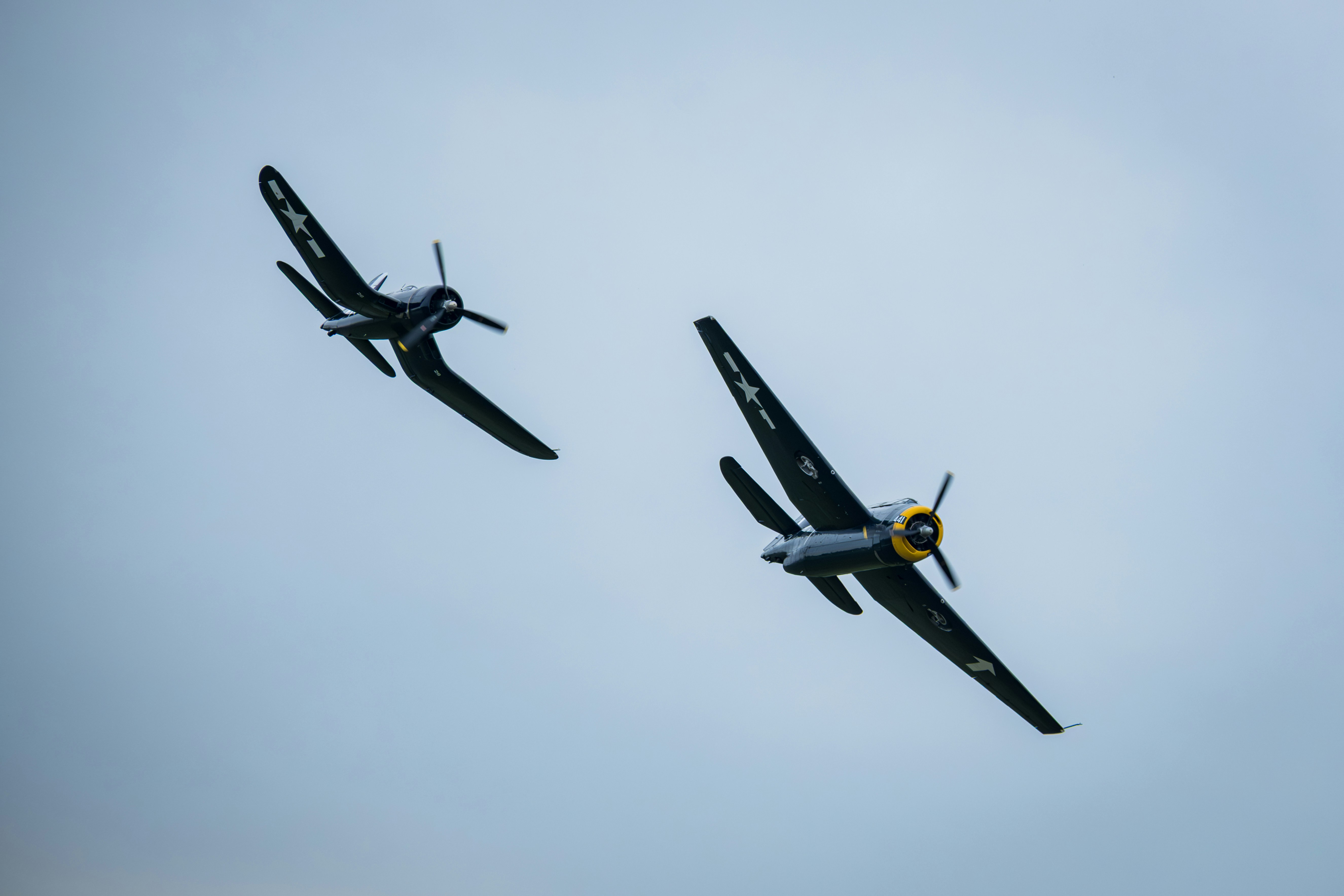 Winged Duel: Twin Fighters in Clear Sky
