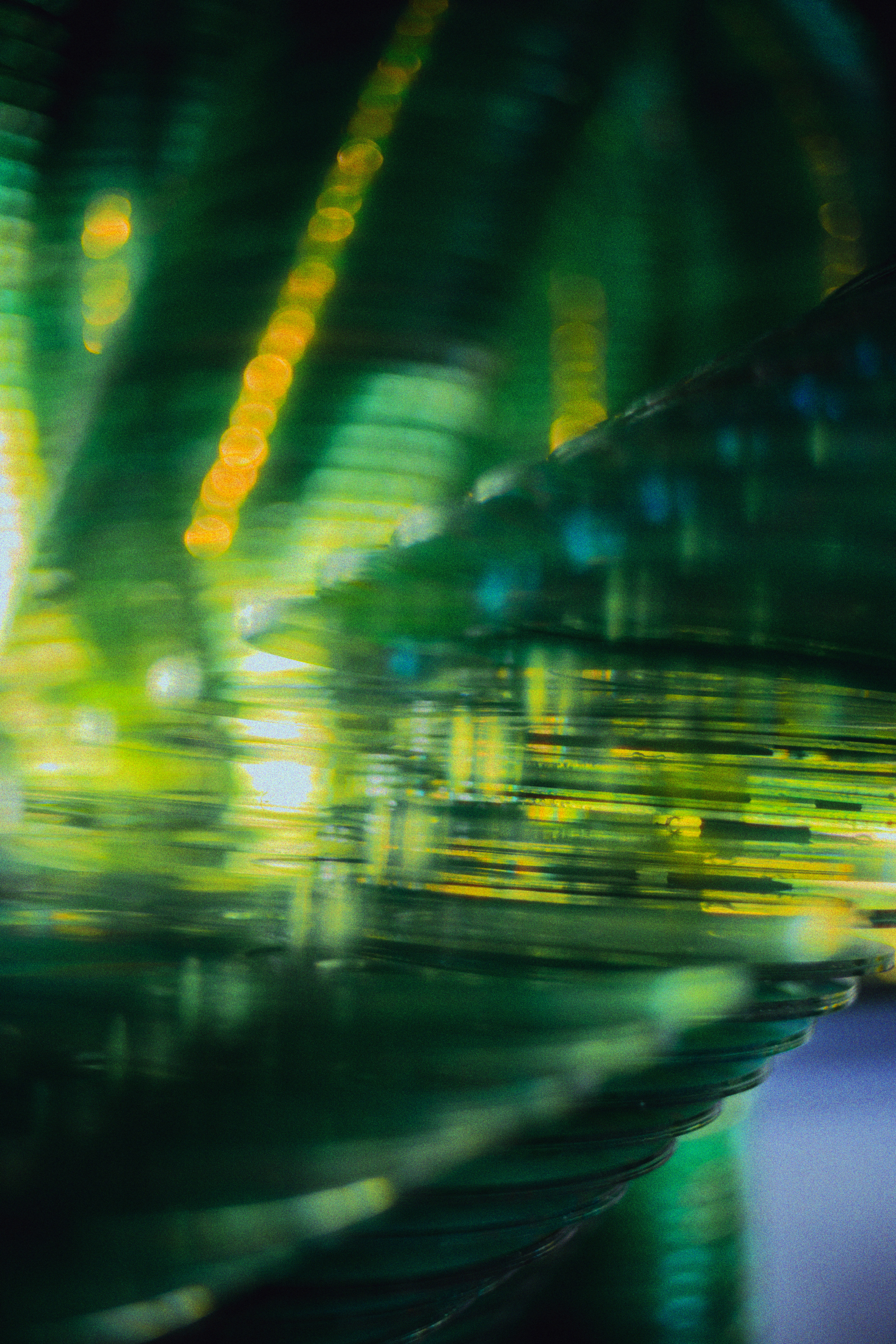 Emerald Pulse: Abstract Green Reflections Across a Glass Surface