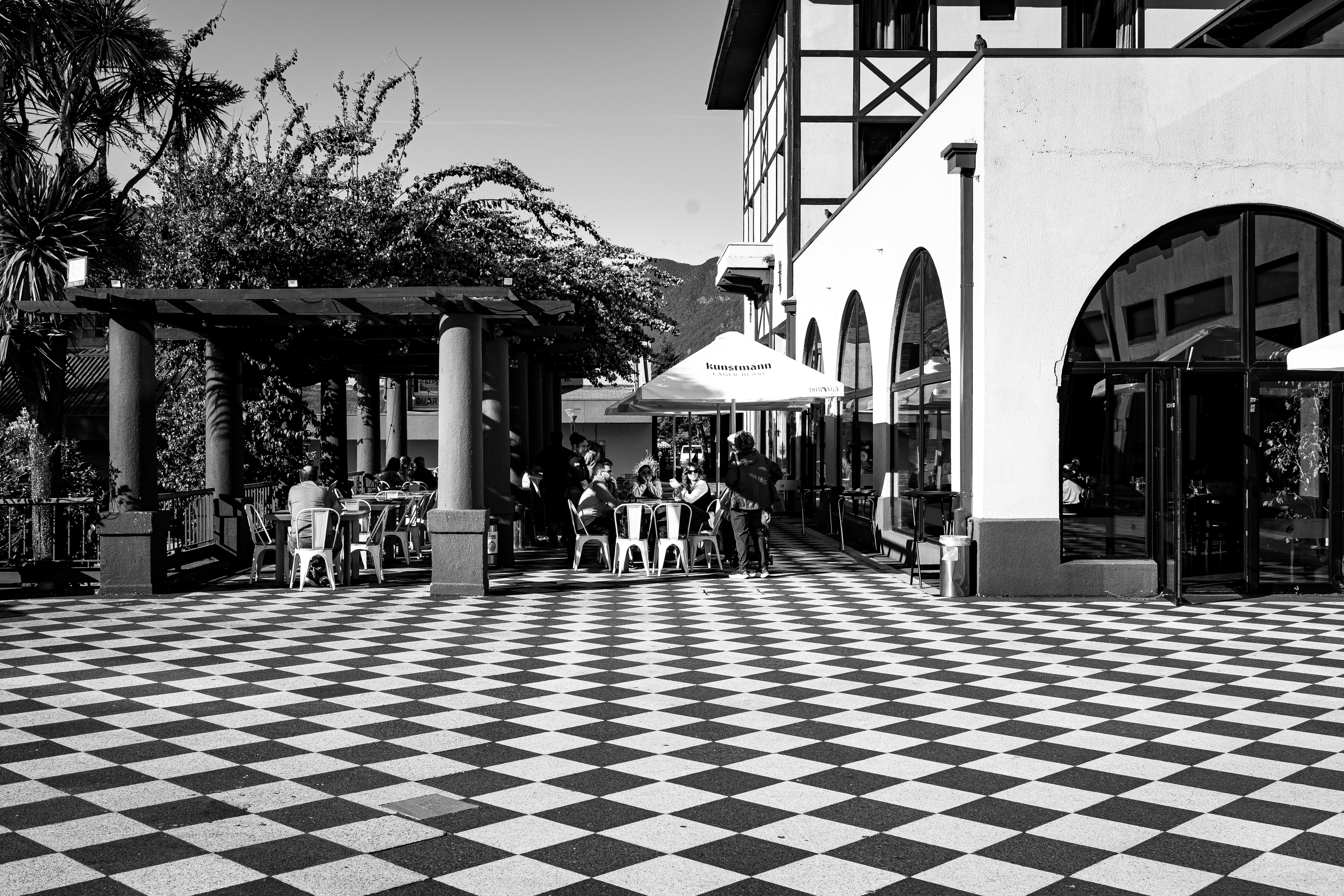 Checkerboard Courtyard Café at Dusk