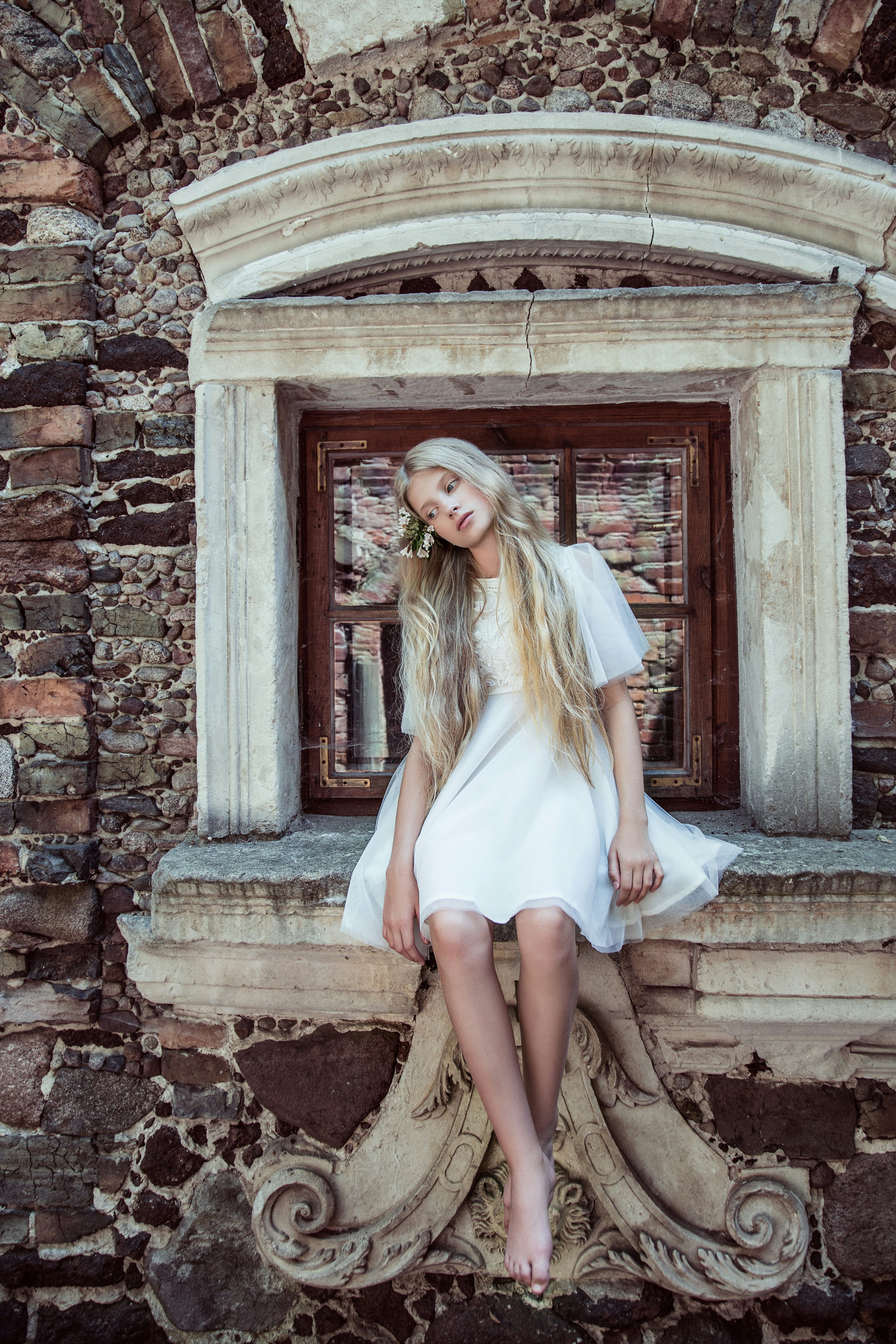 White-dressed Dreamer on Stone Carvings