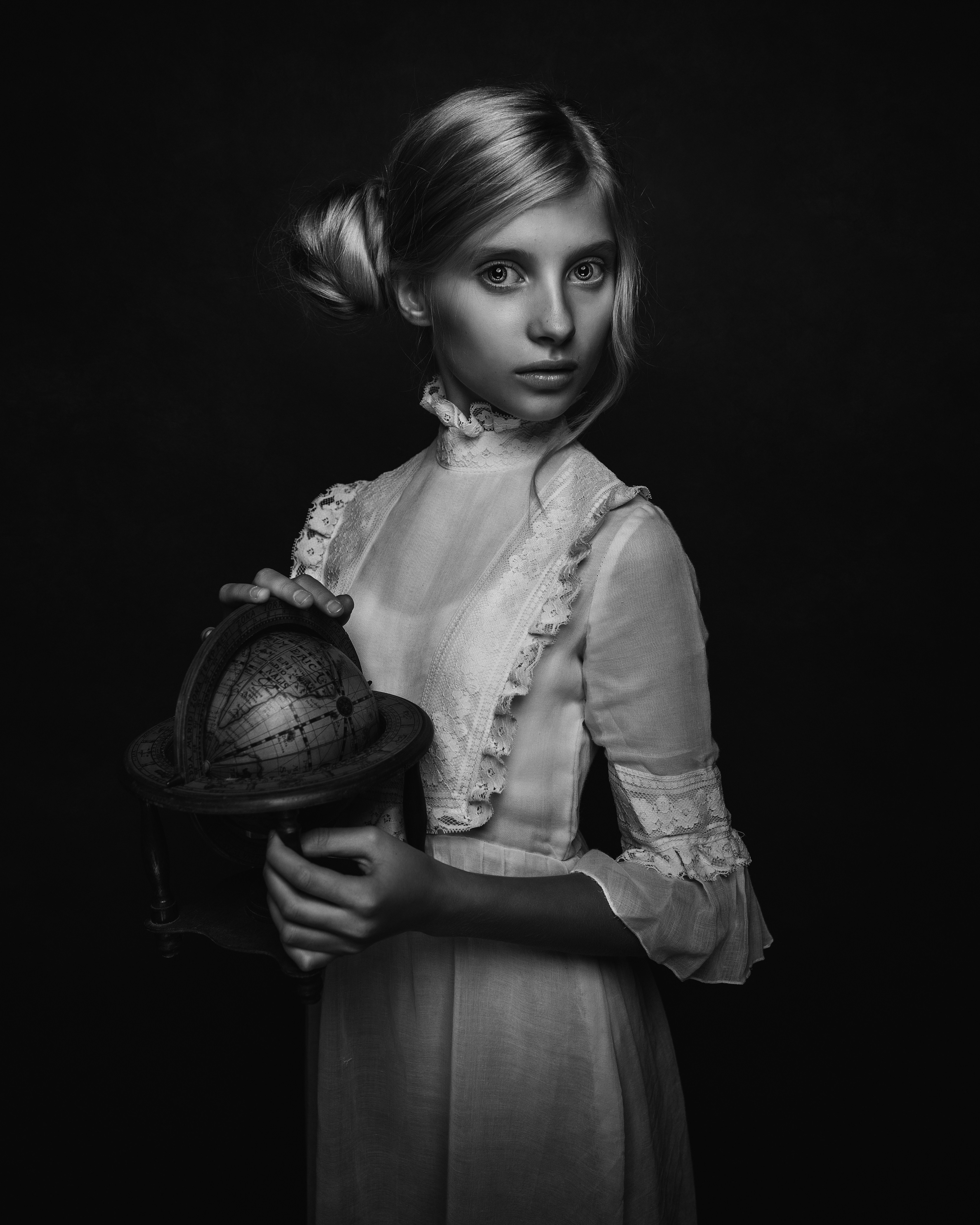 Timeless Echoes: A Gentle Portrait with a World in Hand