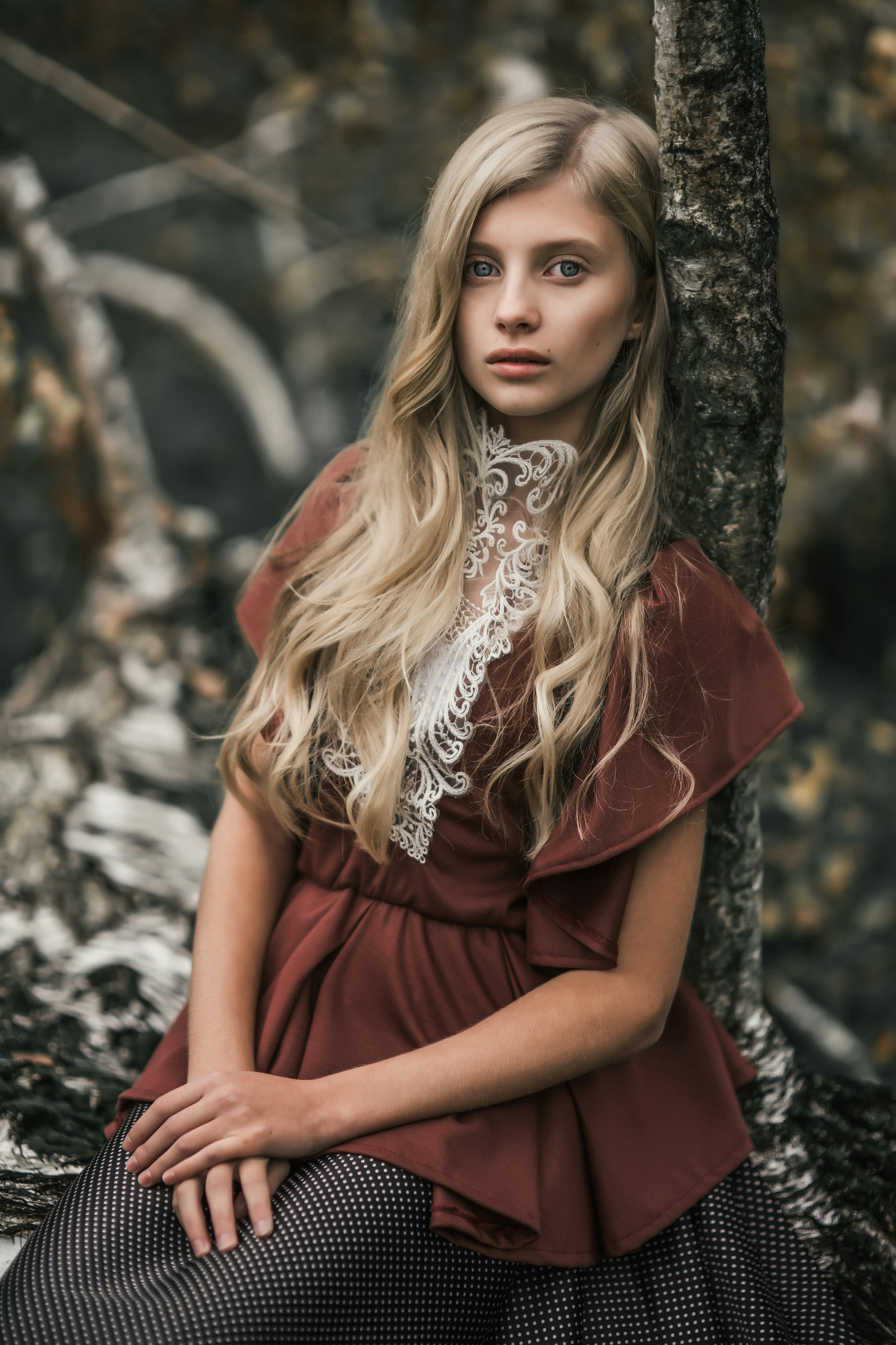 Poised in the Pines: a Portrait in Sepia-Red Lace