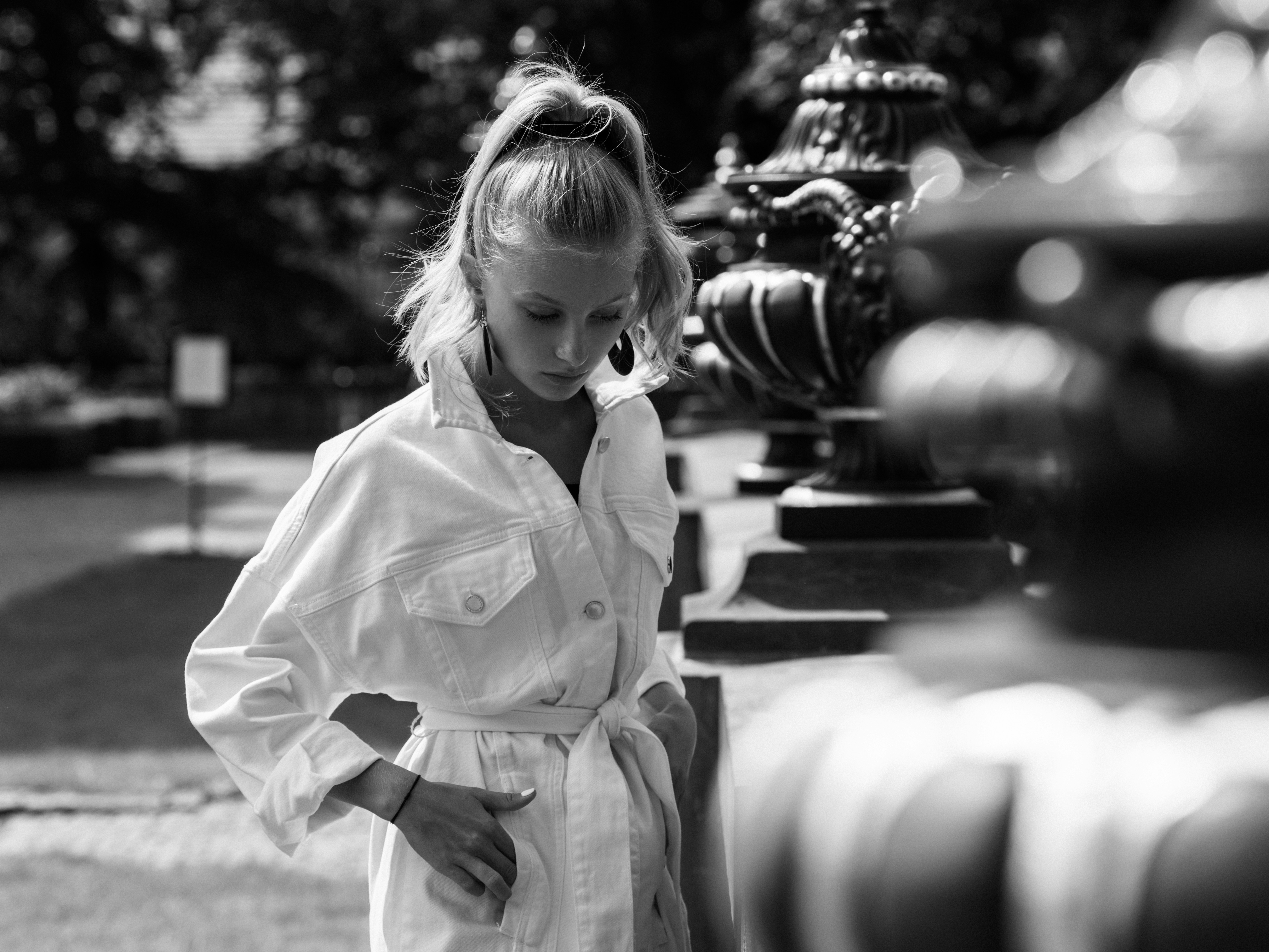 Portrait at the Fountain: A Quiet Thoughtful Moment in Mono