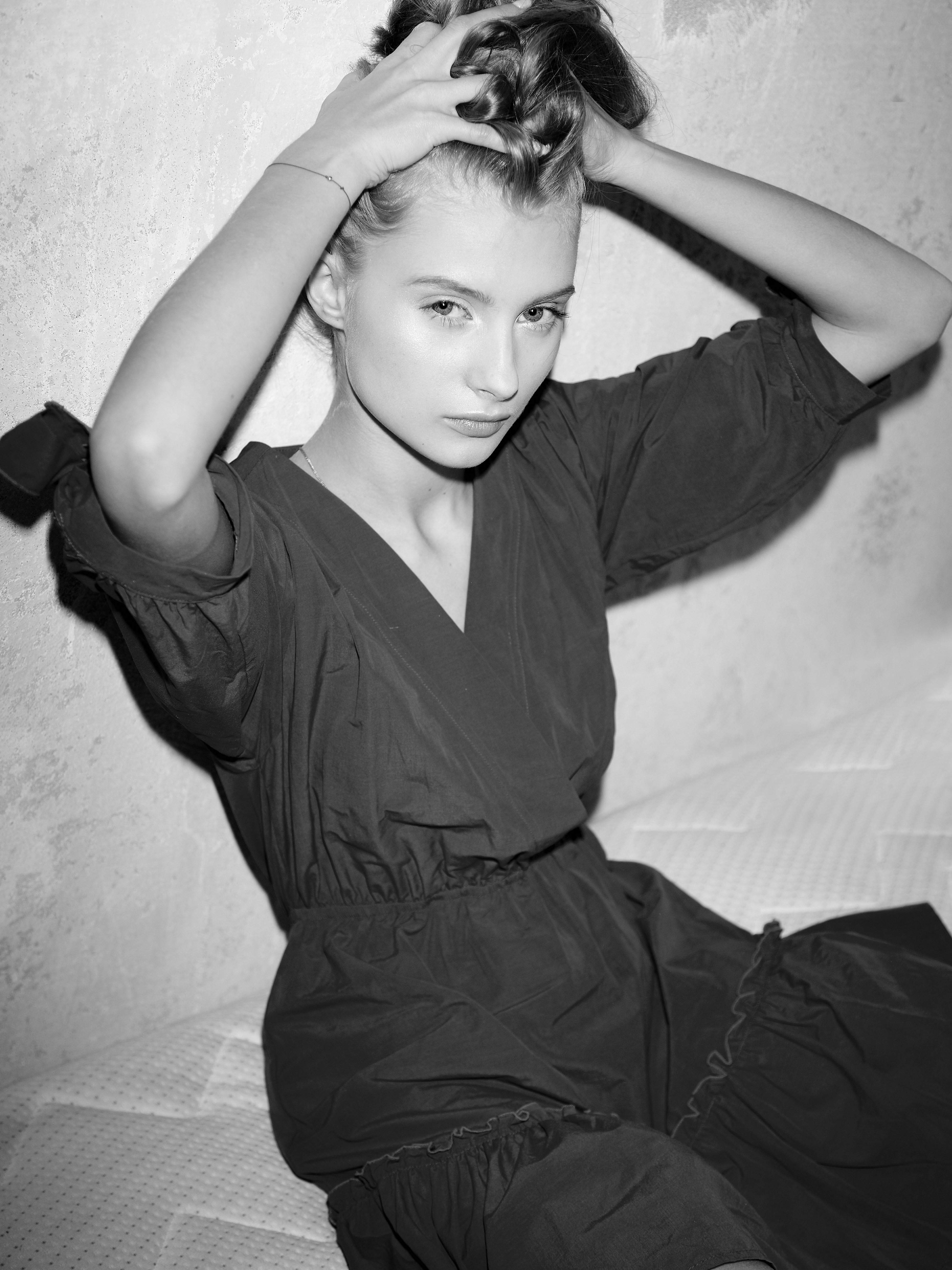 Monochrome Portrait: Soft Pose with Hands in Hair