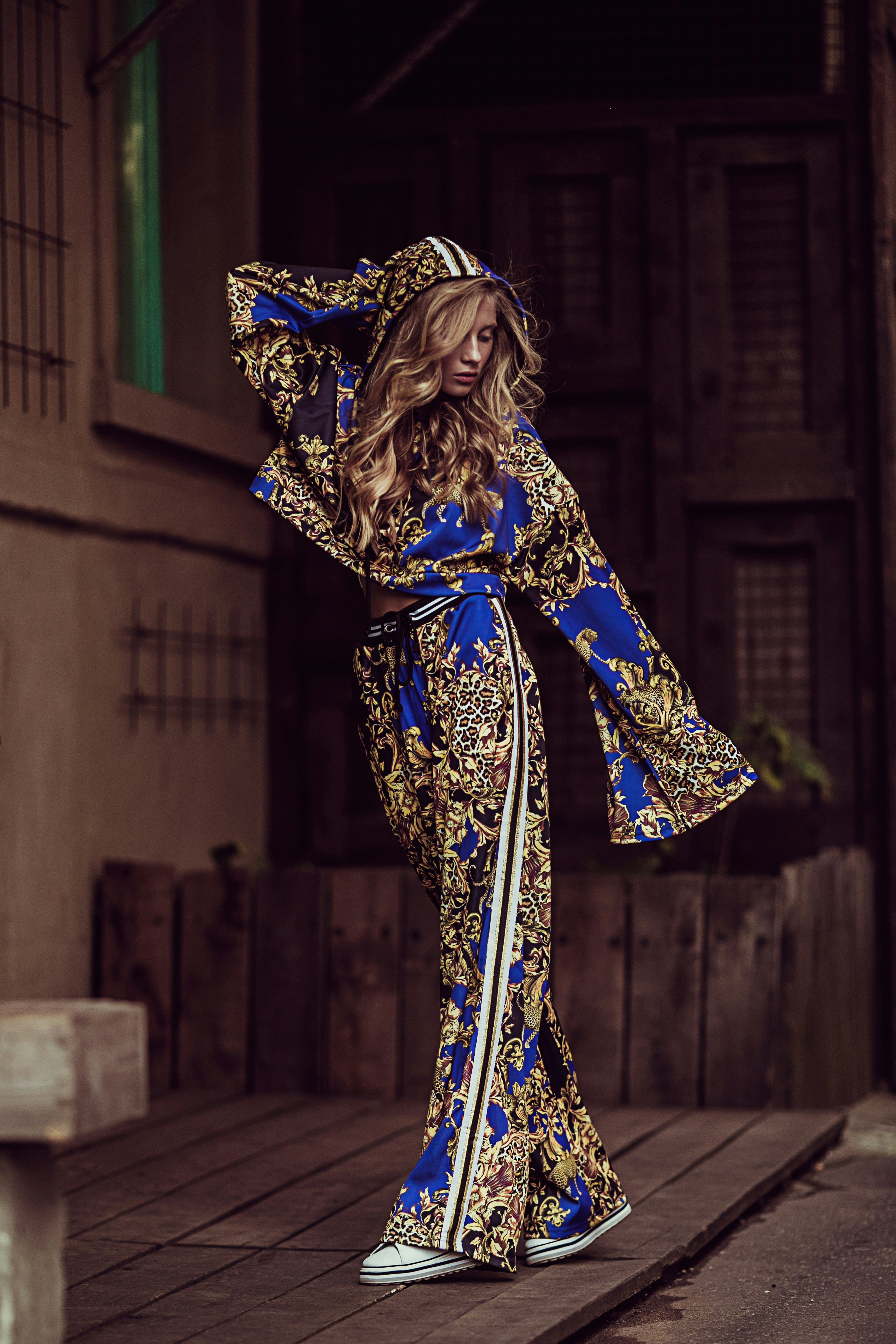 Gold-Threaded Grace: A Silk-Blue Portrait in an Alleyway