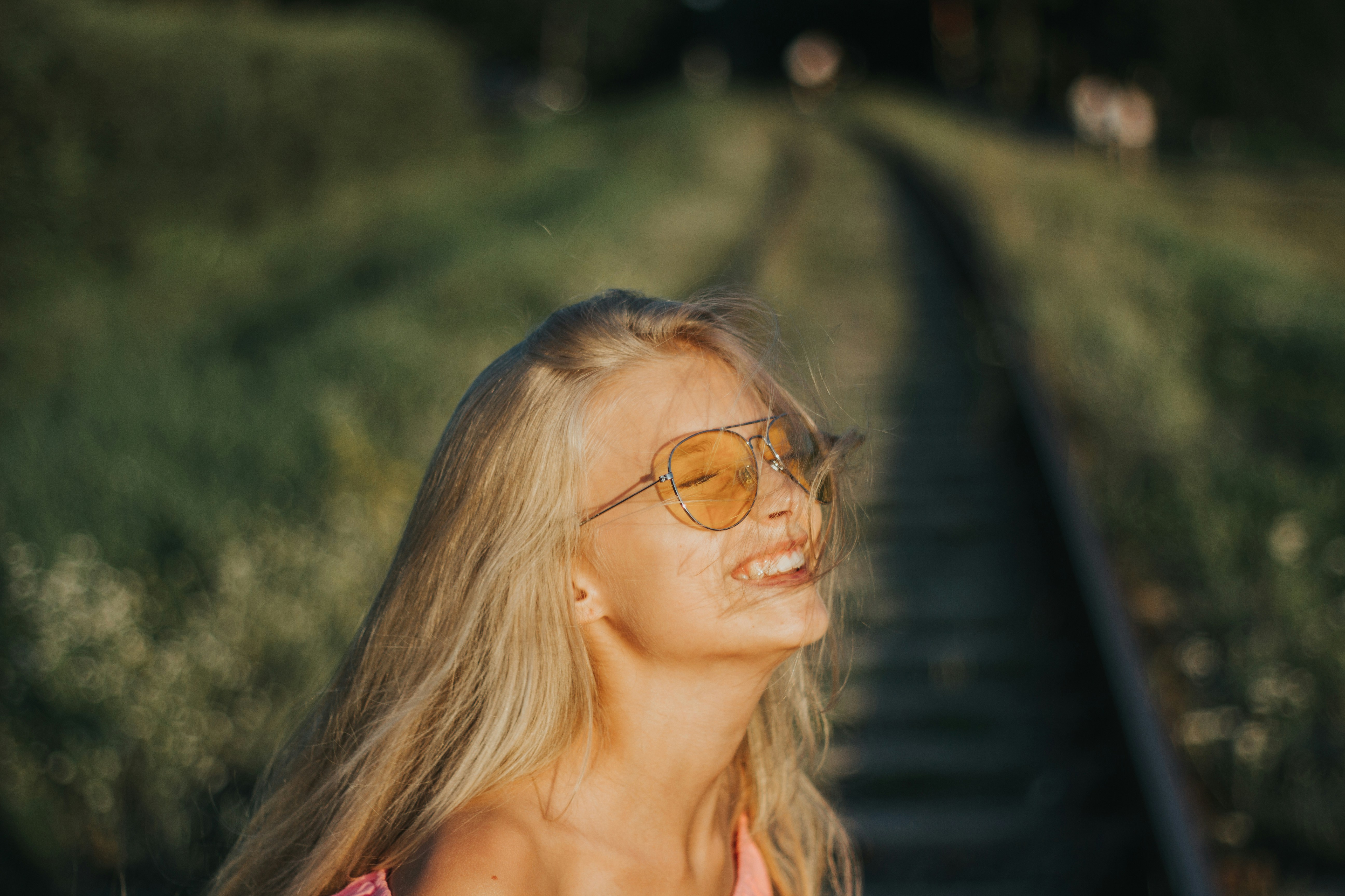 Sunlit Smile on a Railside Path