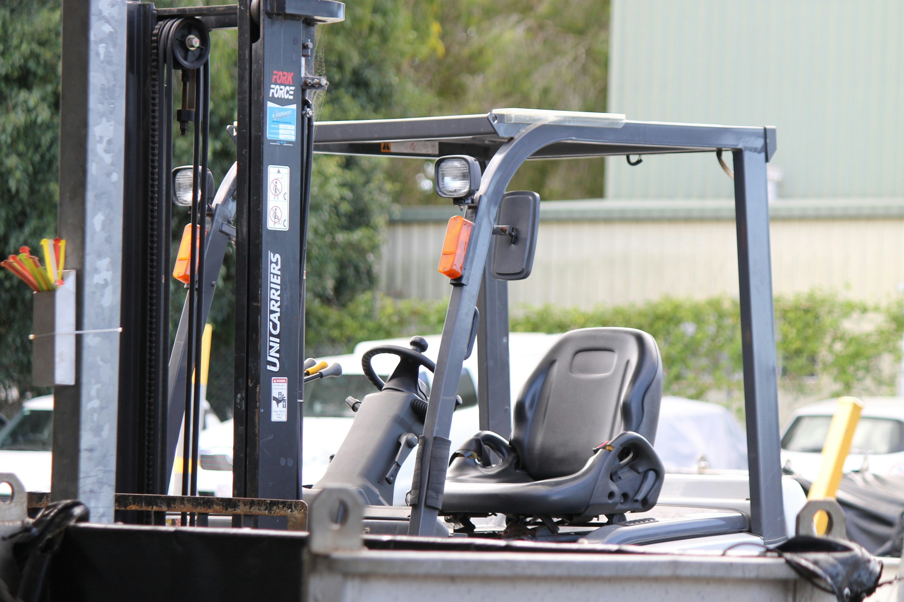 Forklift Frame: The Operator Seat Amid Industrial Terrain
