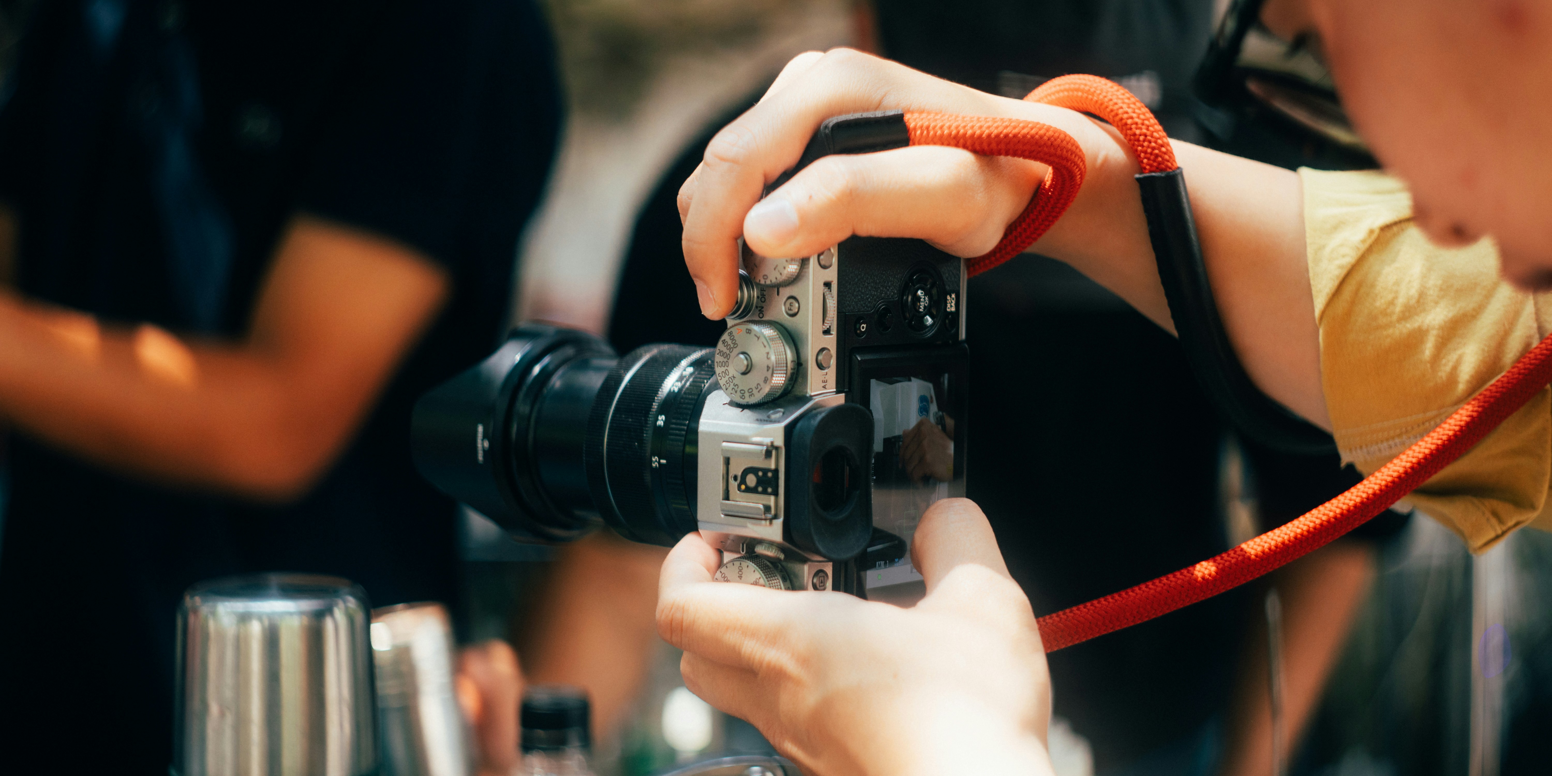 Hands-On Precision: A glimpse into the camera grip and dials in motion