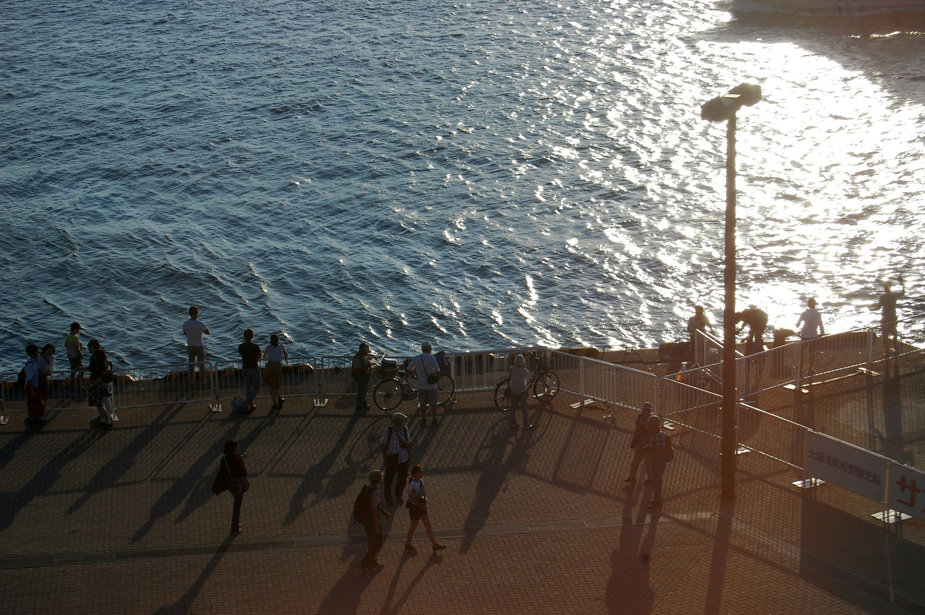 Sunlit Promenade Overlooking the Glimmering Sea