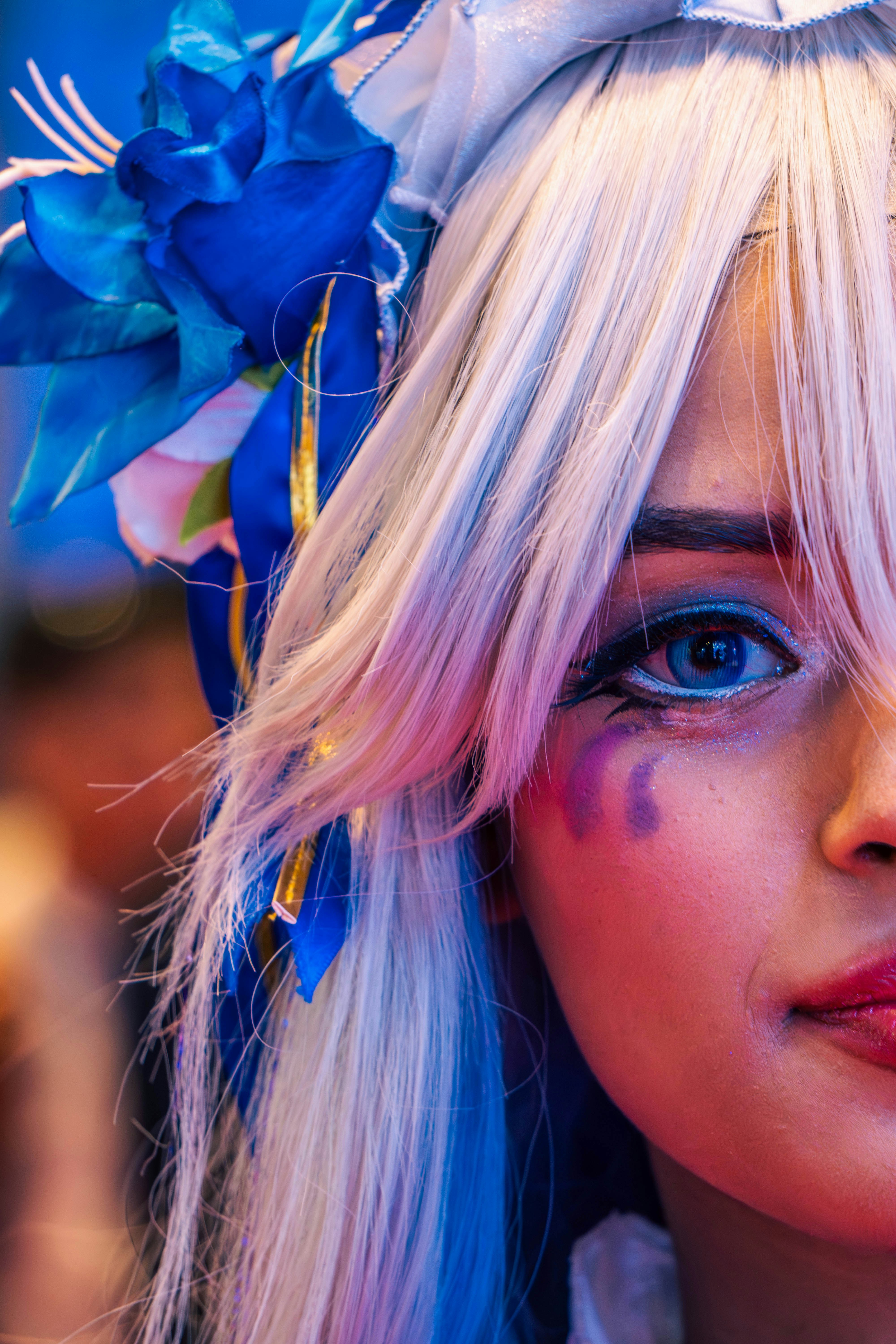 Blue Blossom Portrait: Neon Hair and Eye as the Focal Spark