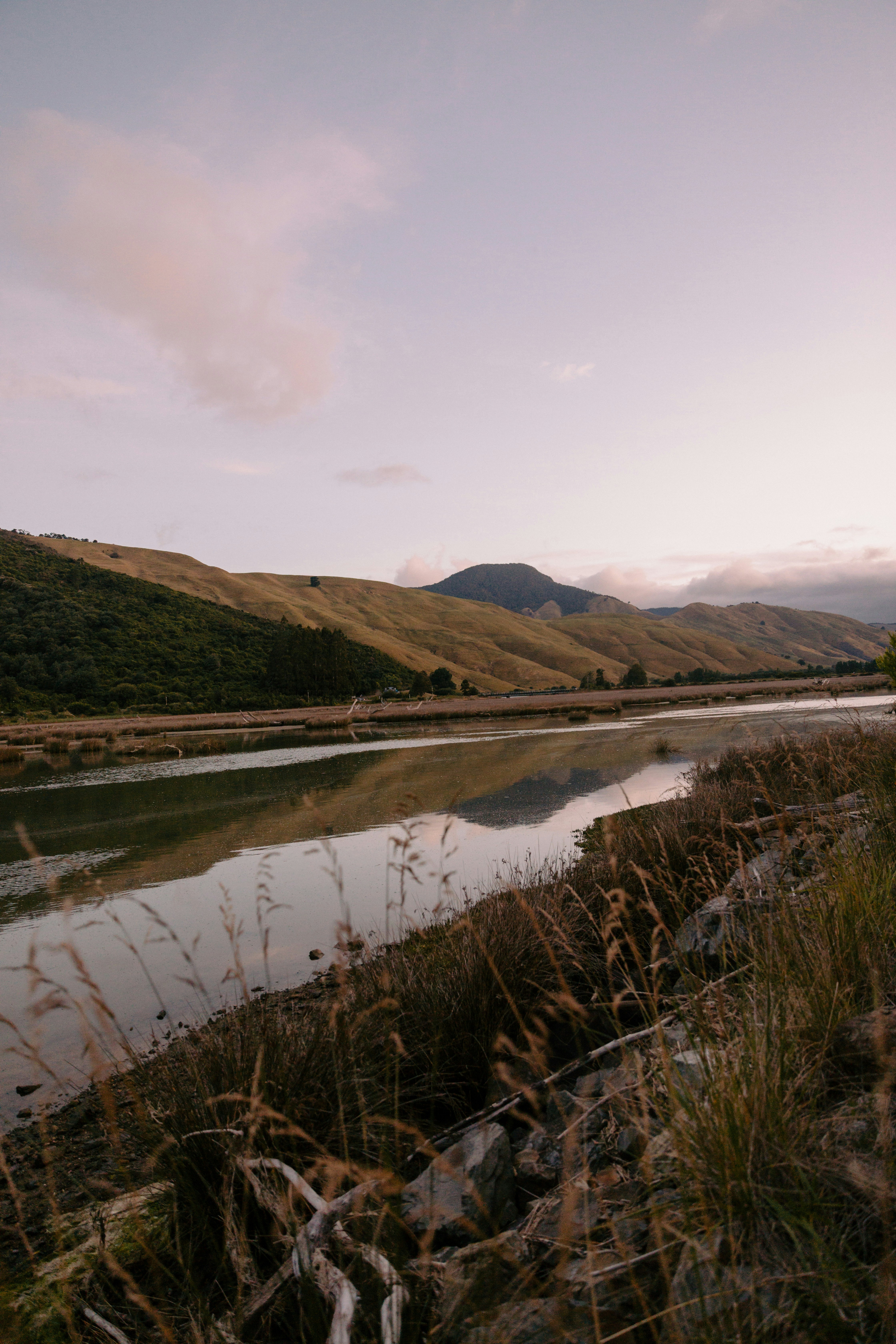 Quiet Ridge at Golden Hour by a Meandering River
