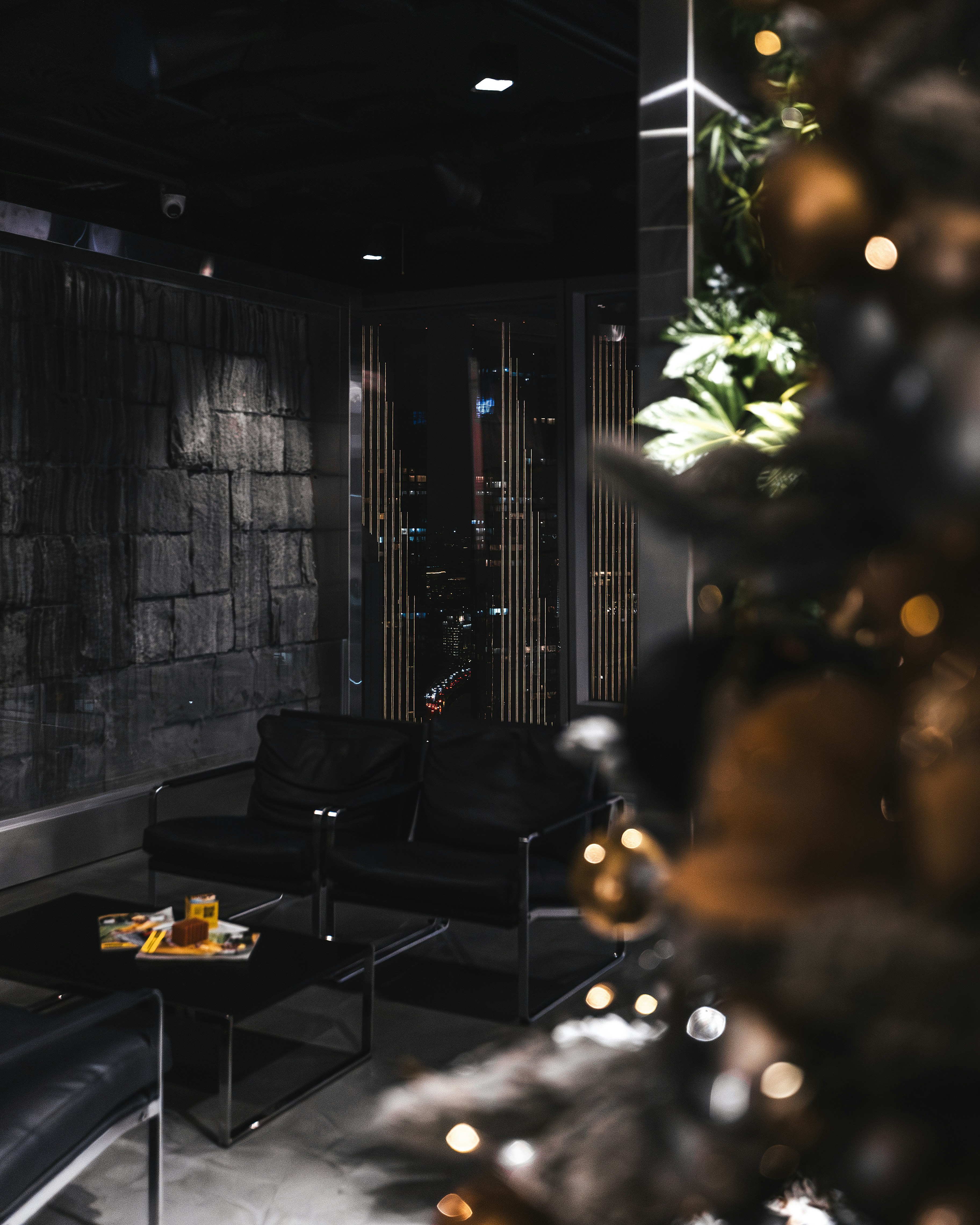 City Skyline Glimpse Through a Cozy Lounge Window