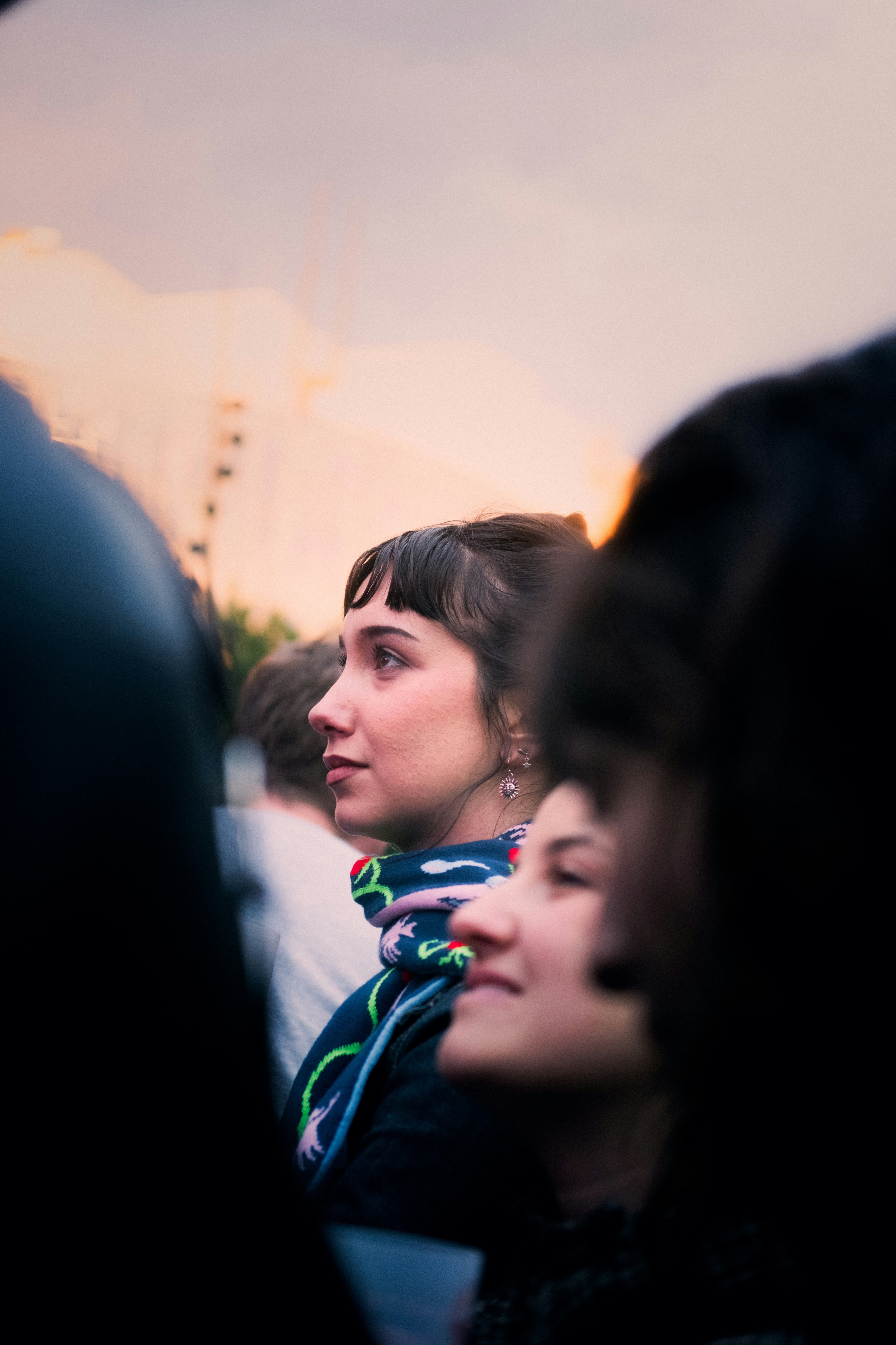 Mid-Show Contemplation: A Woman in a Crowd