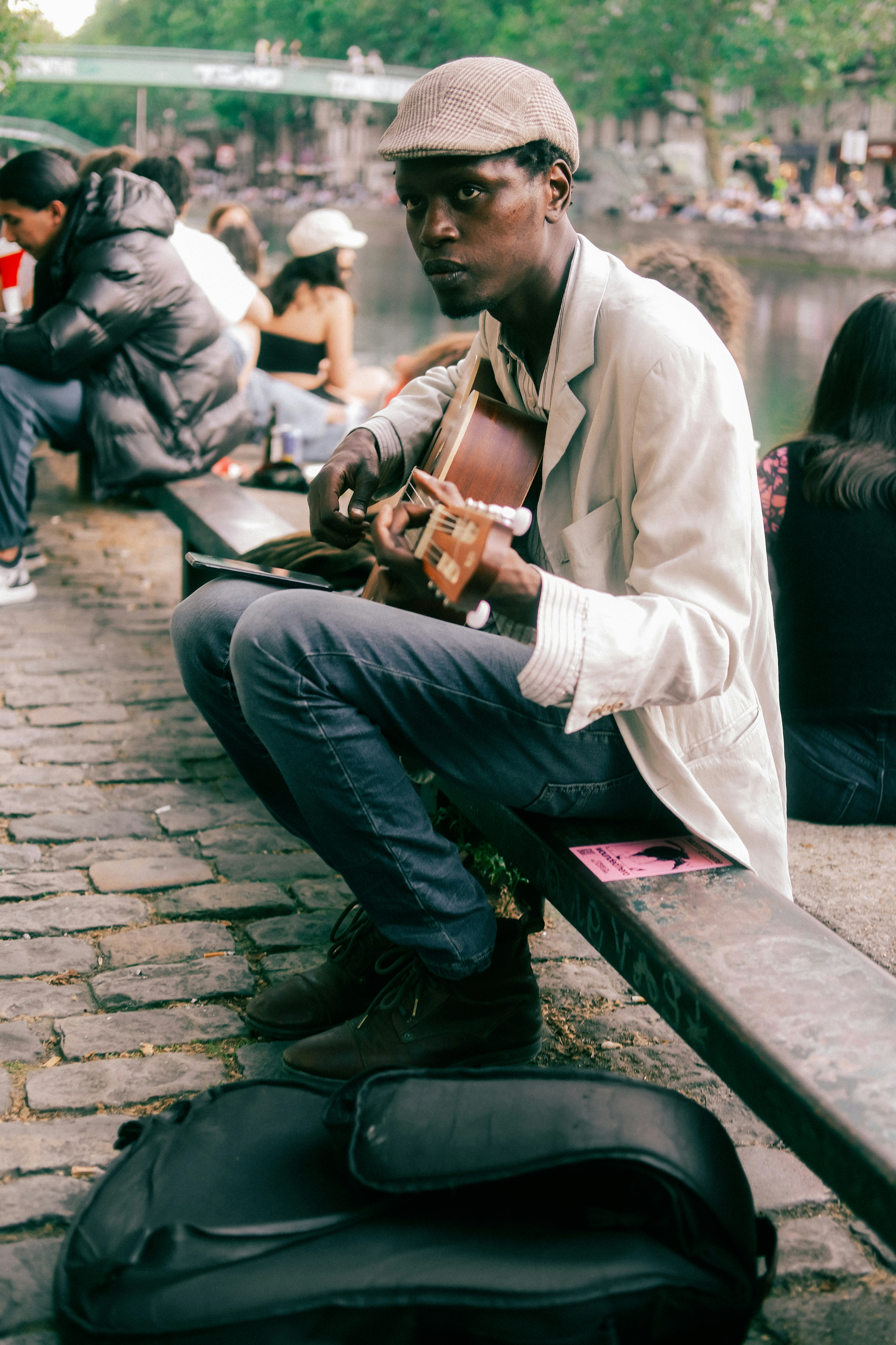 Guitar in the Park: A Quiet Moment by the Water