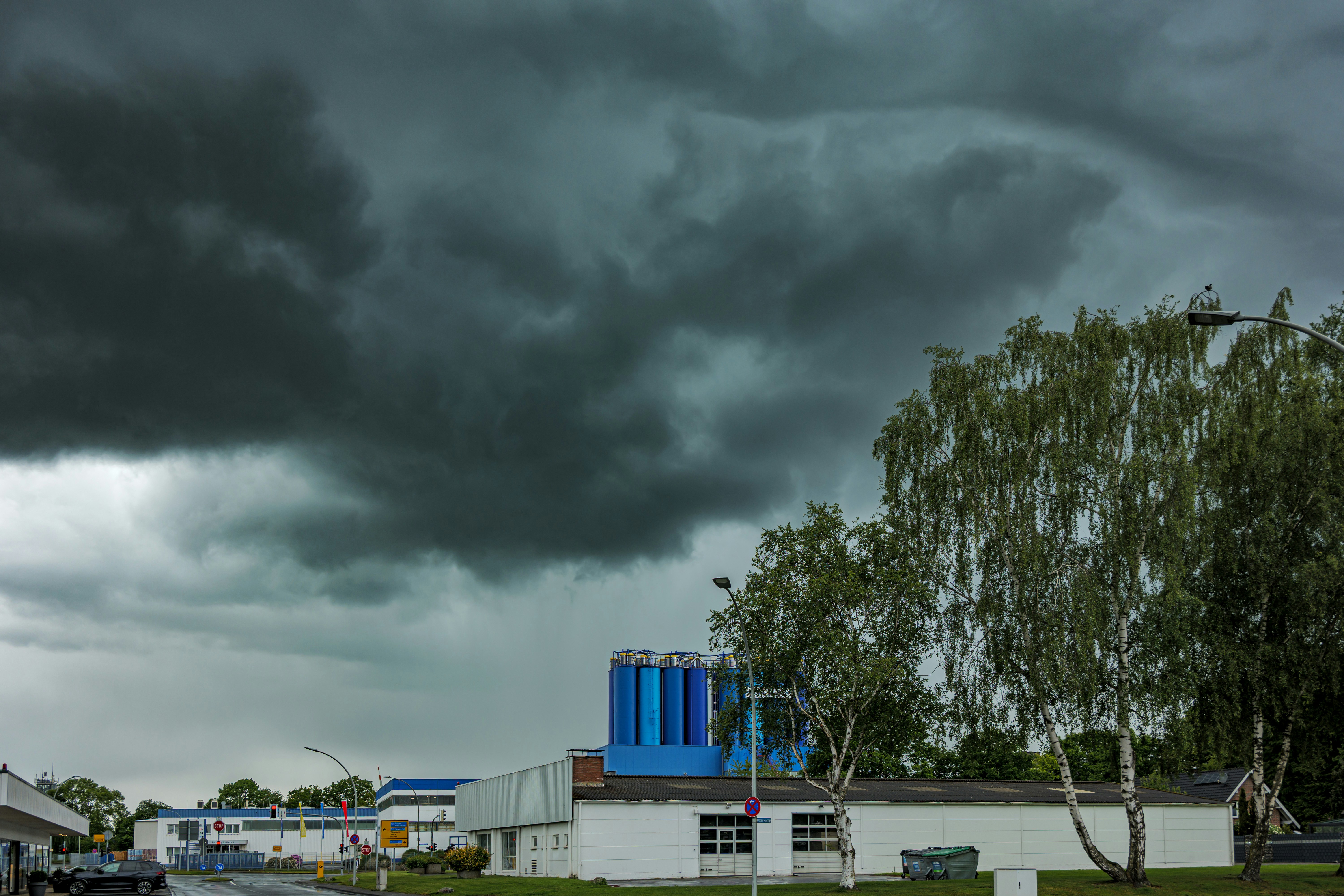 Storm Approaches Over an Industrial Campus