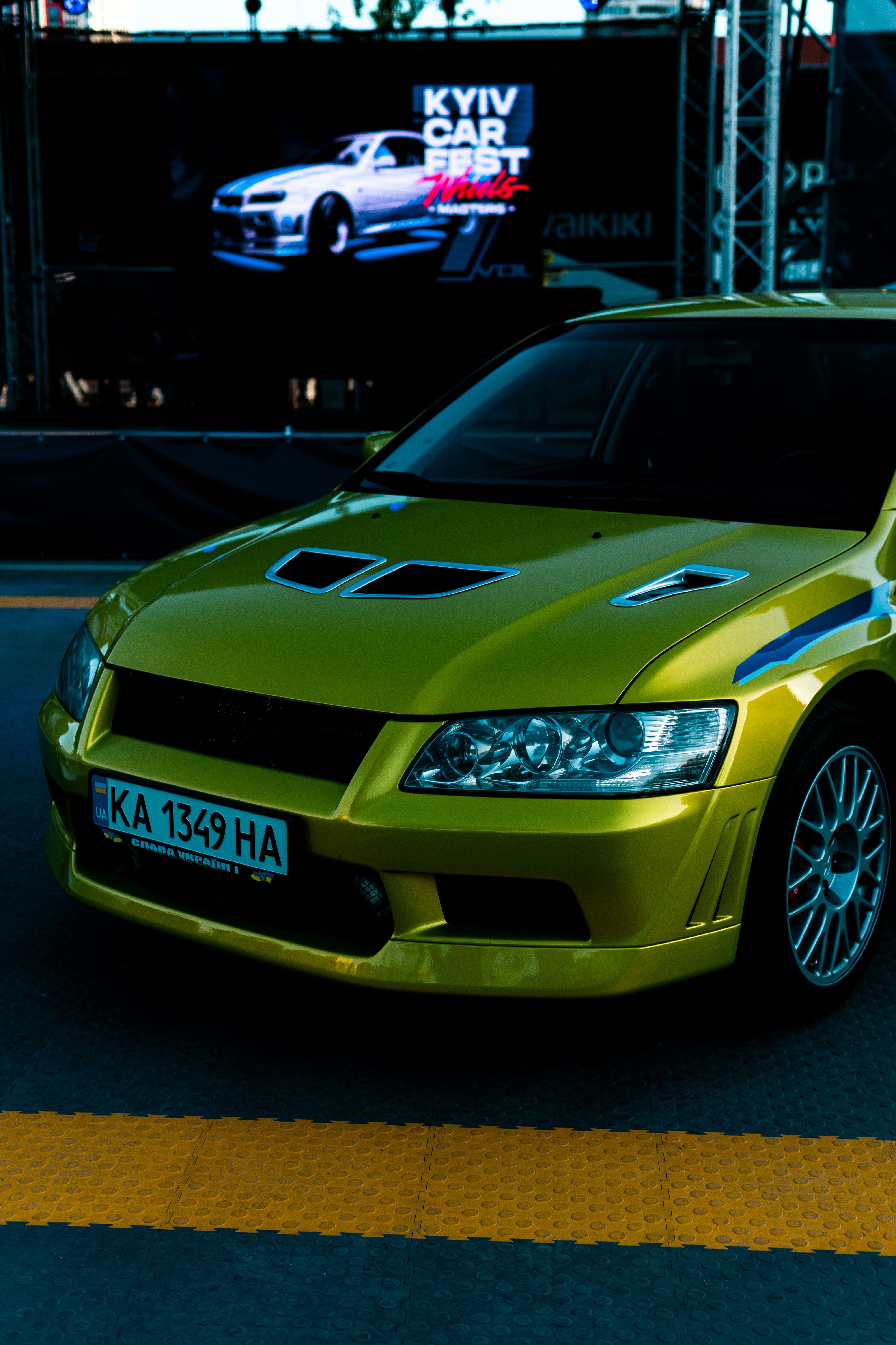 Luminous Yellow Drift King at the City Stage