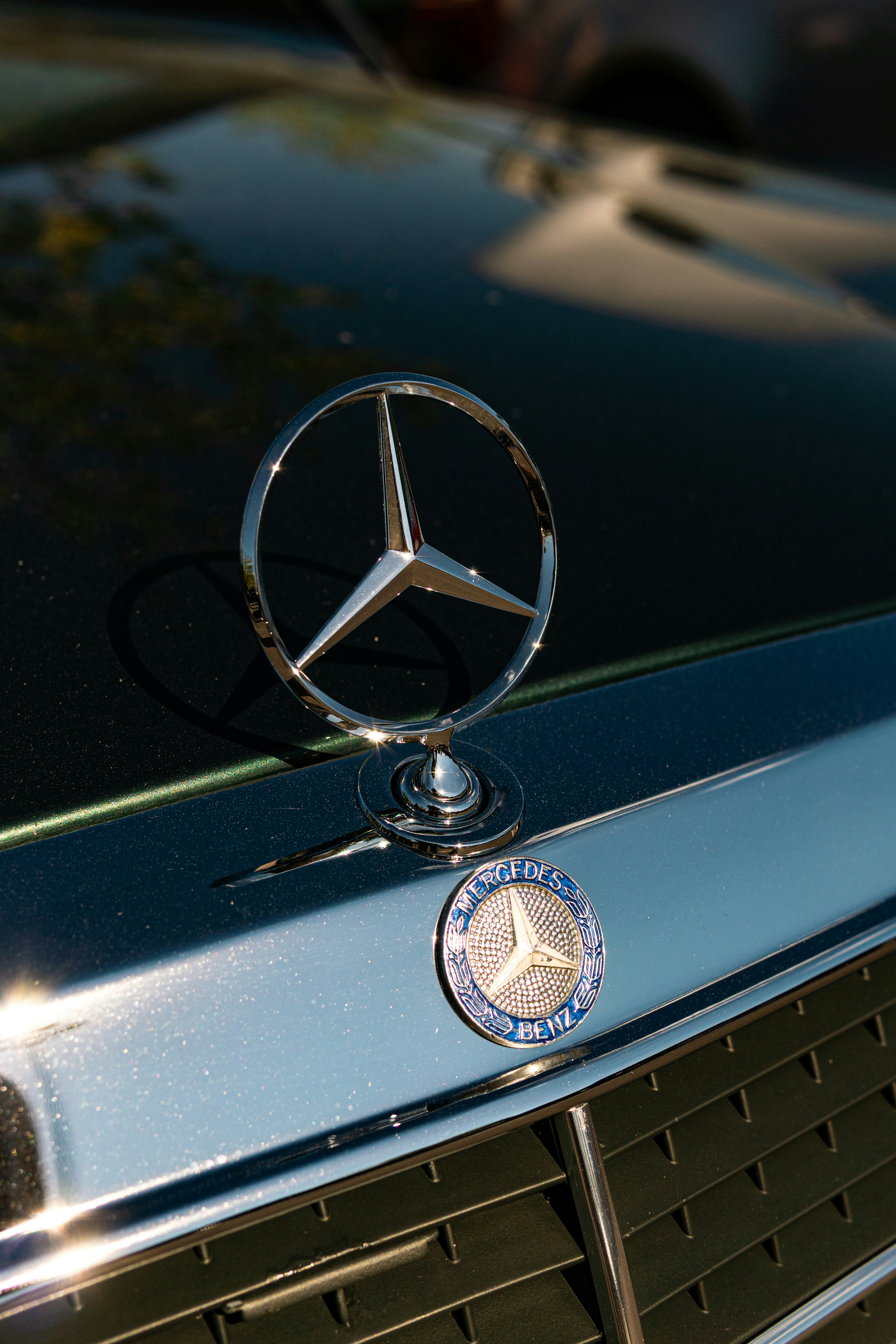 Shimmering Star: A Mercedes Emblem Gracing the Car's Hood