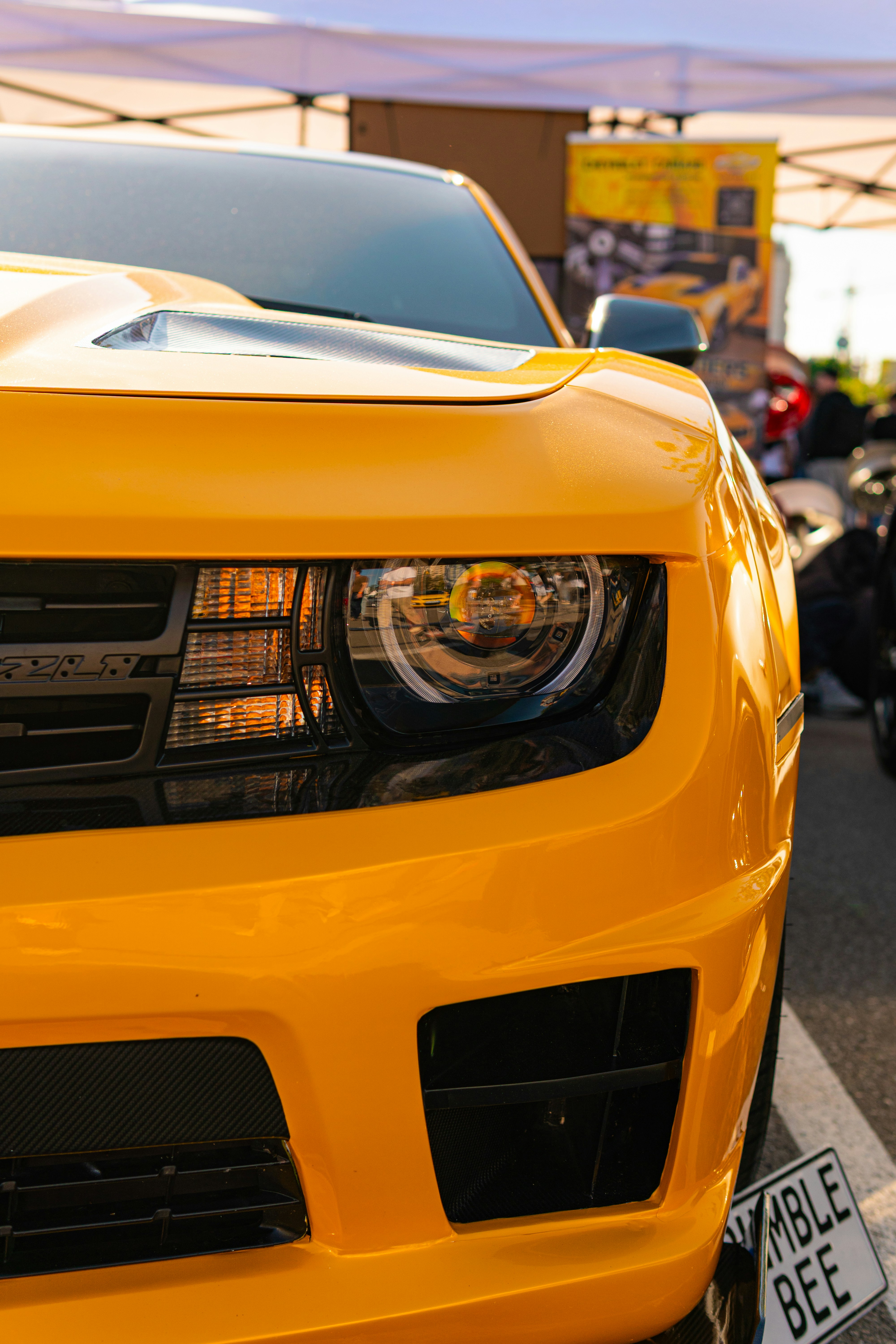 Front-Quarter Glare: The Yellow Muscle Car Spearheading a Show