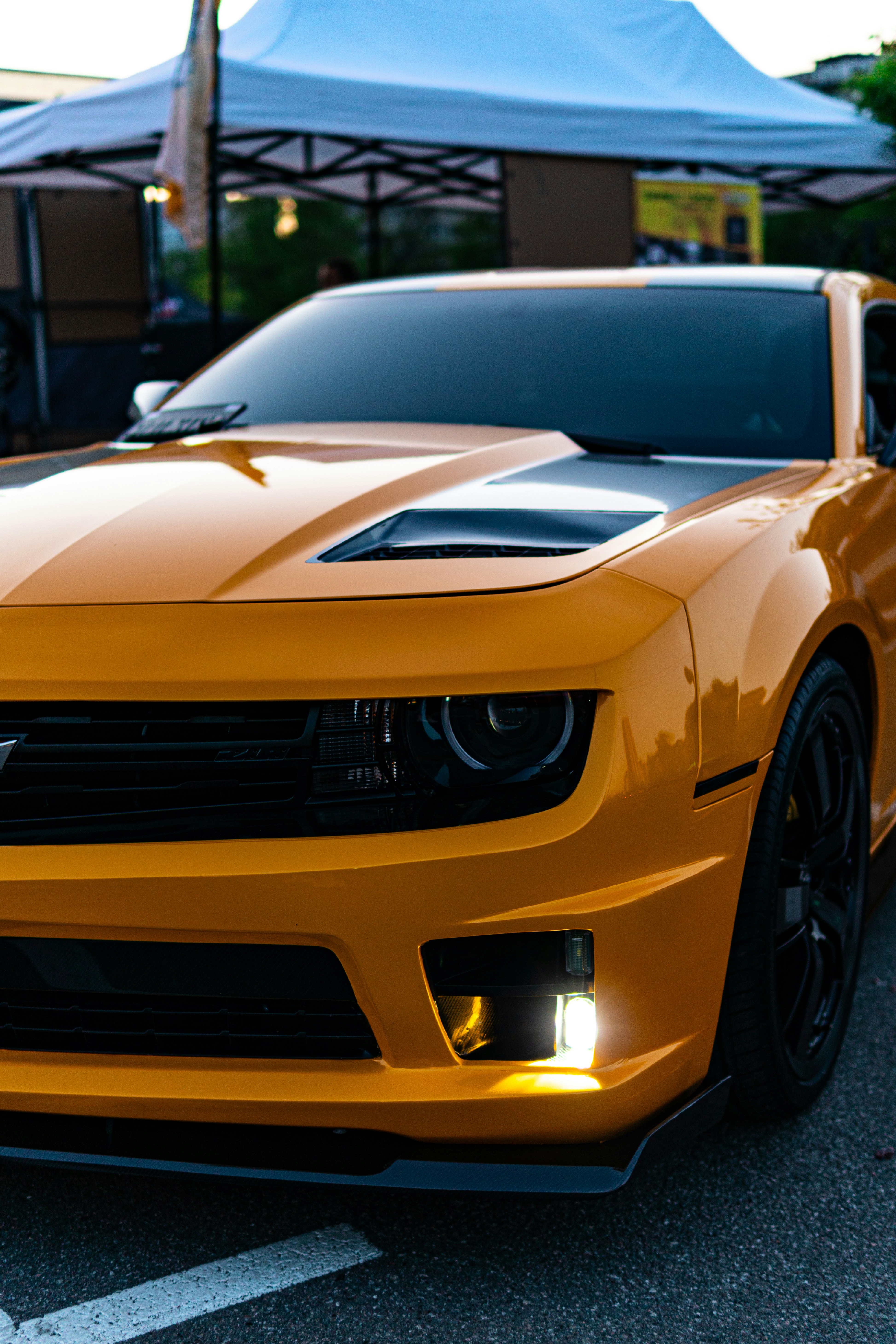 Golden Hammer: A Muscle Car Under Neon Light
