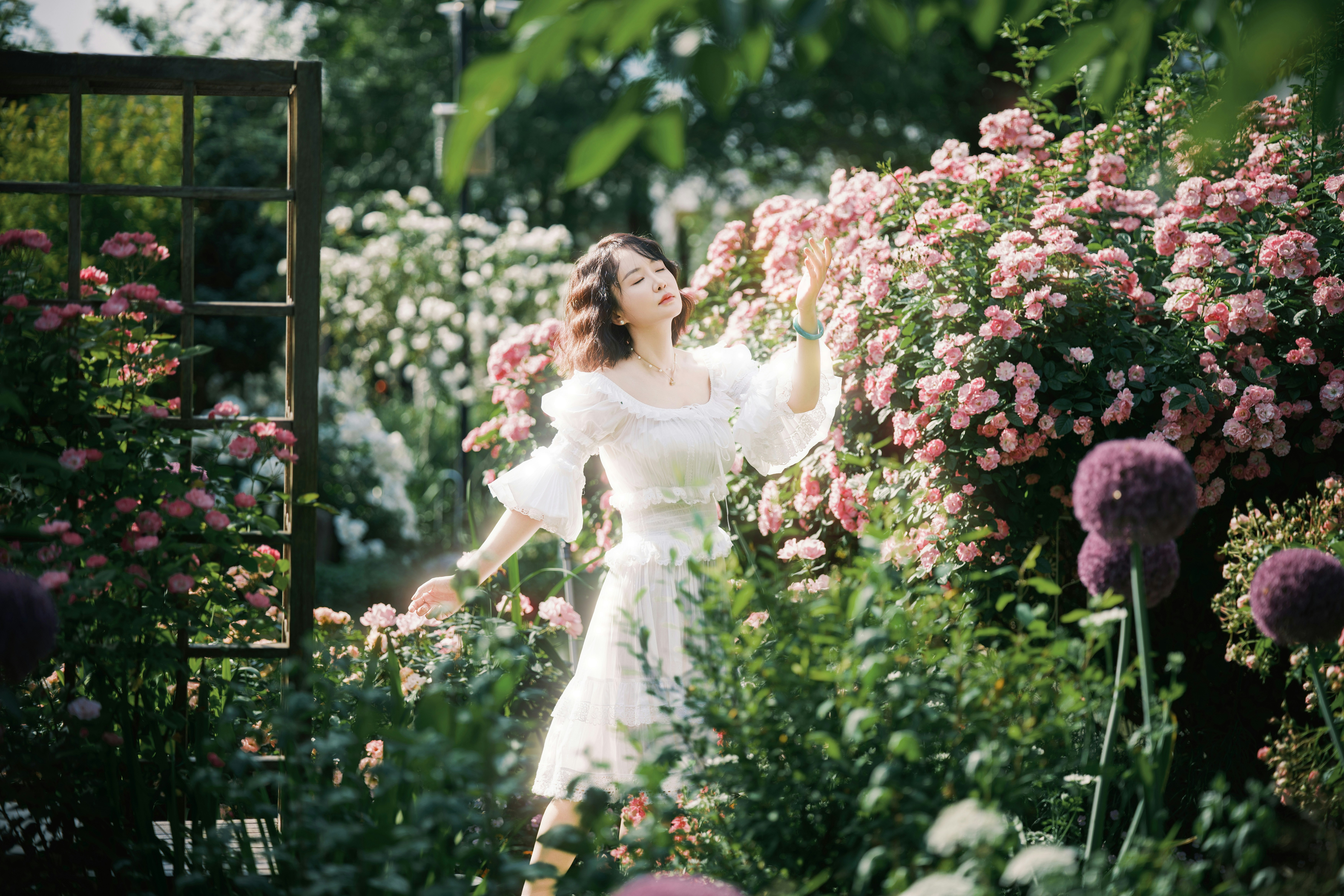 Whispers of Spring: A Delicate Moment Among Pink Blooms