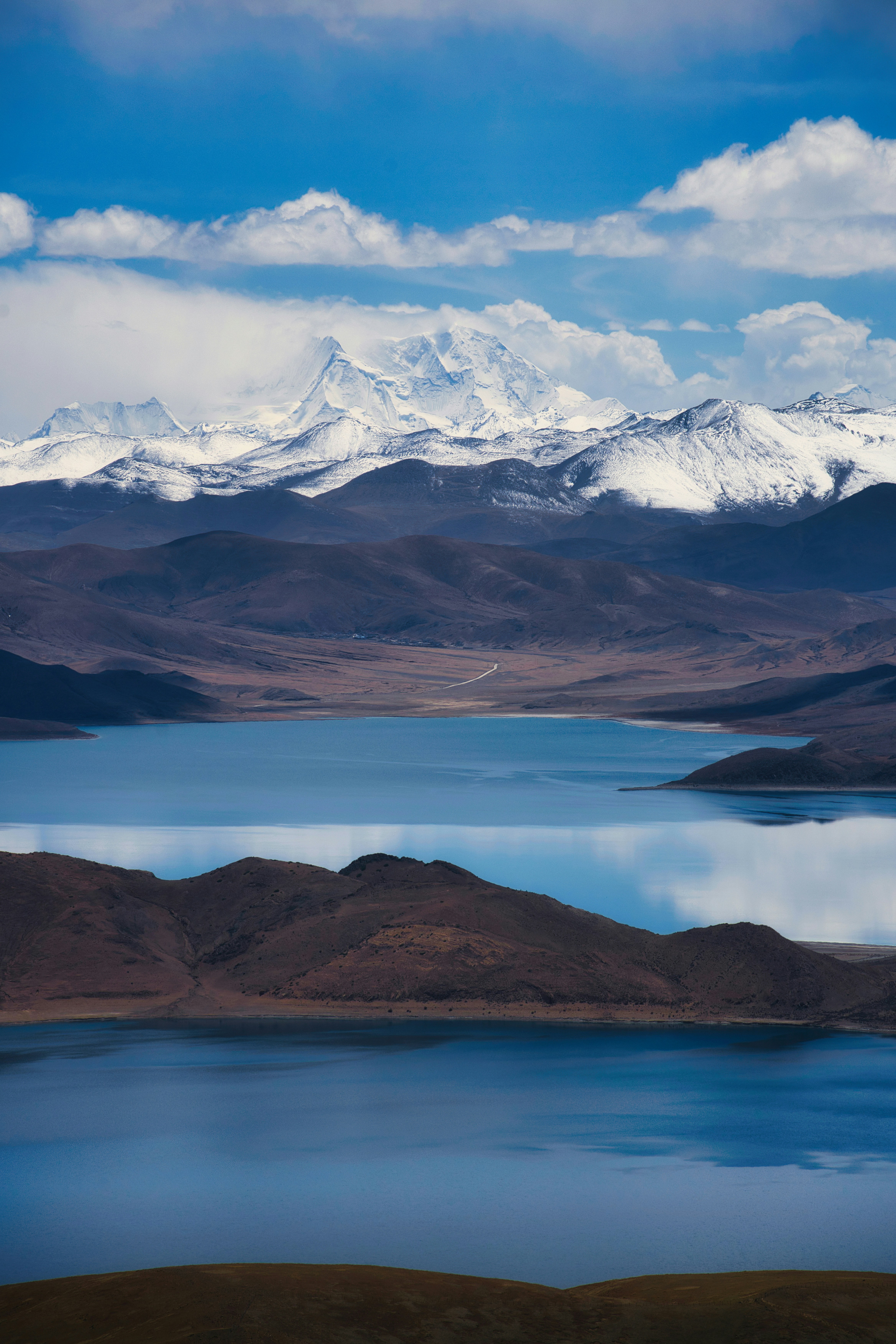 Snow-capped Peaks Over Serene Blue Lagoons