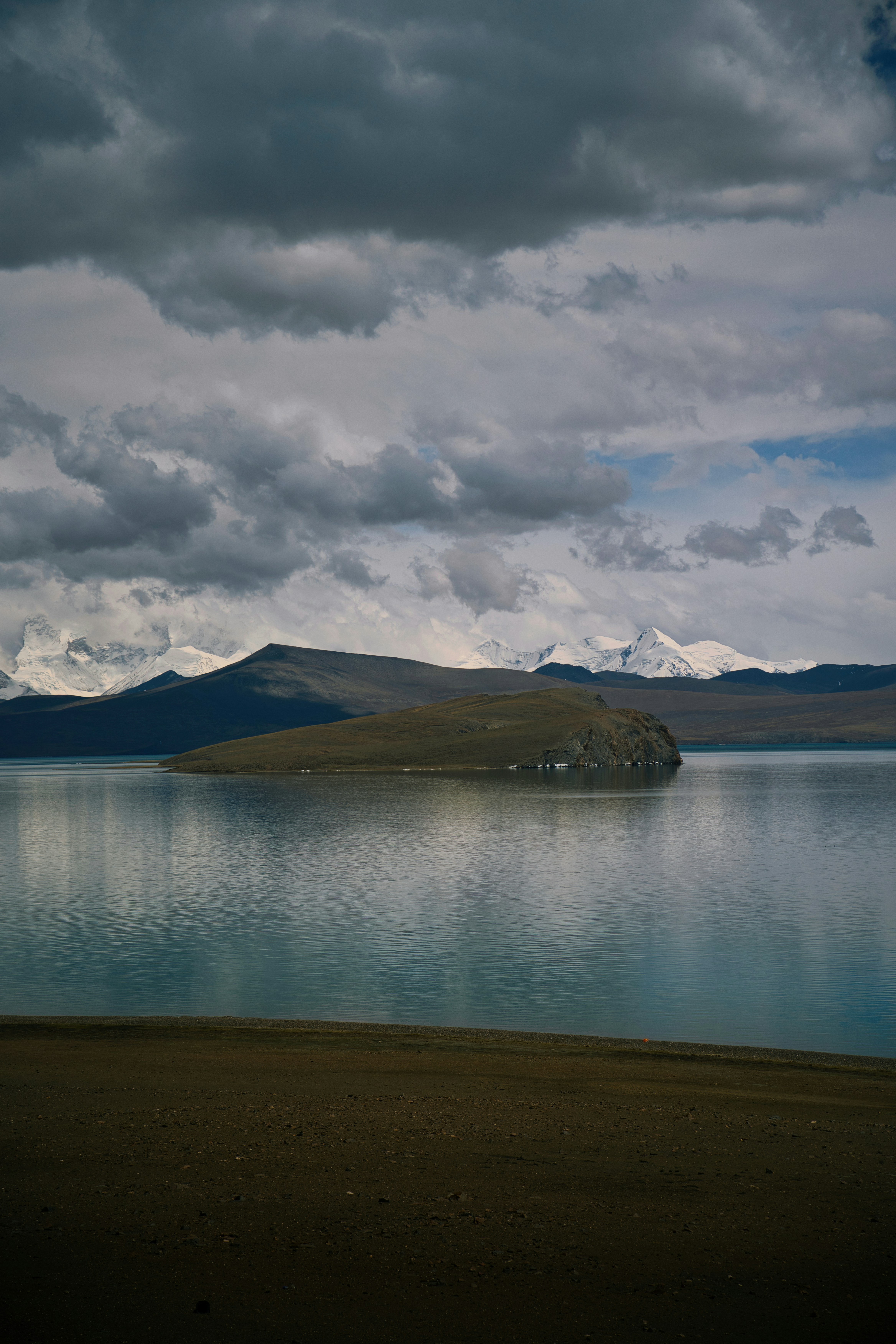 Island of Calm Under Brooding Clouds