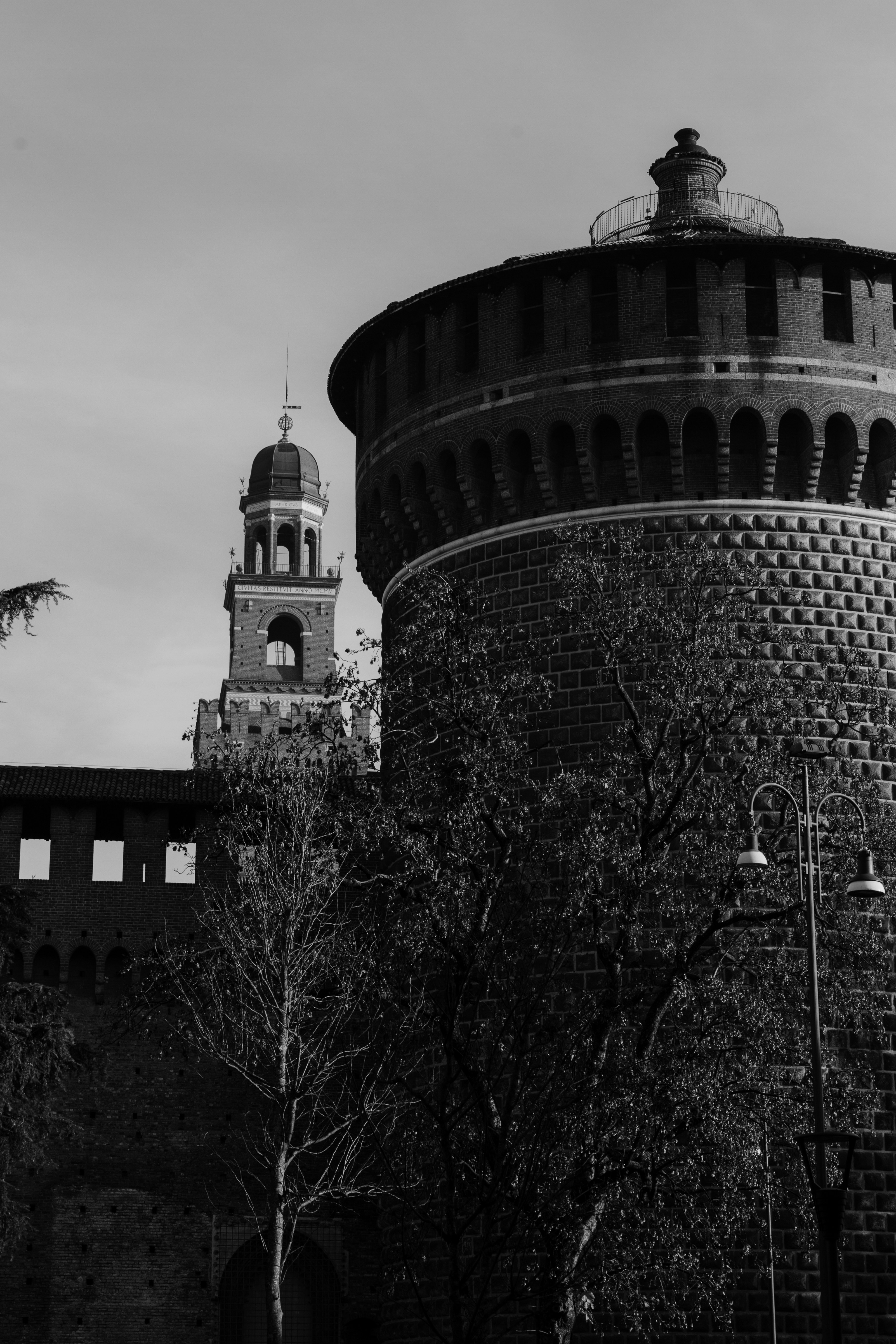 Stone Roundhouse and Clocktower Silhouette in Twilight