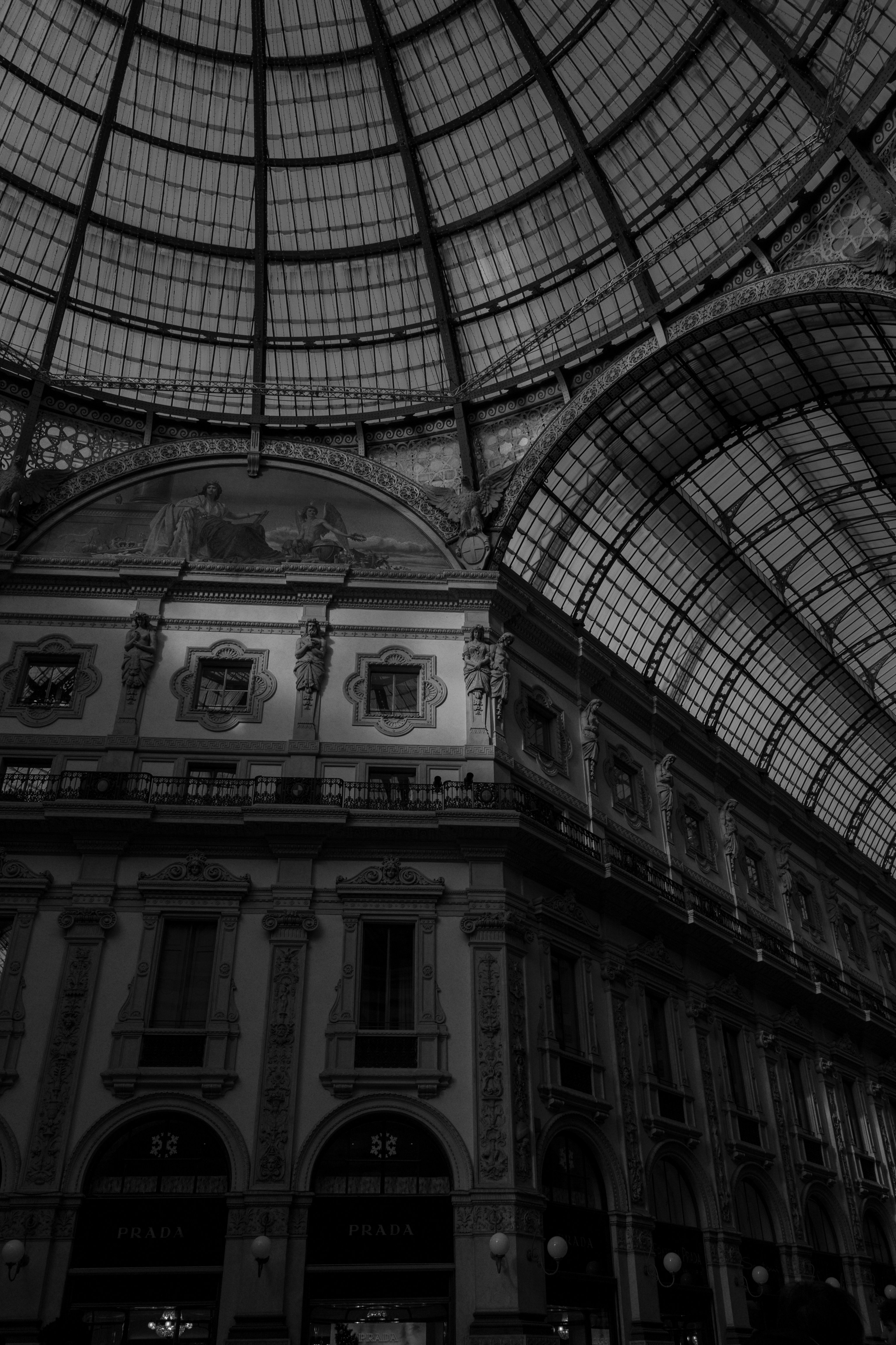 Architectural Grandeur under Glass: A Venetian Arcade in Shadow
