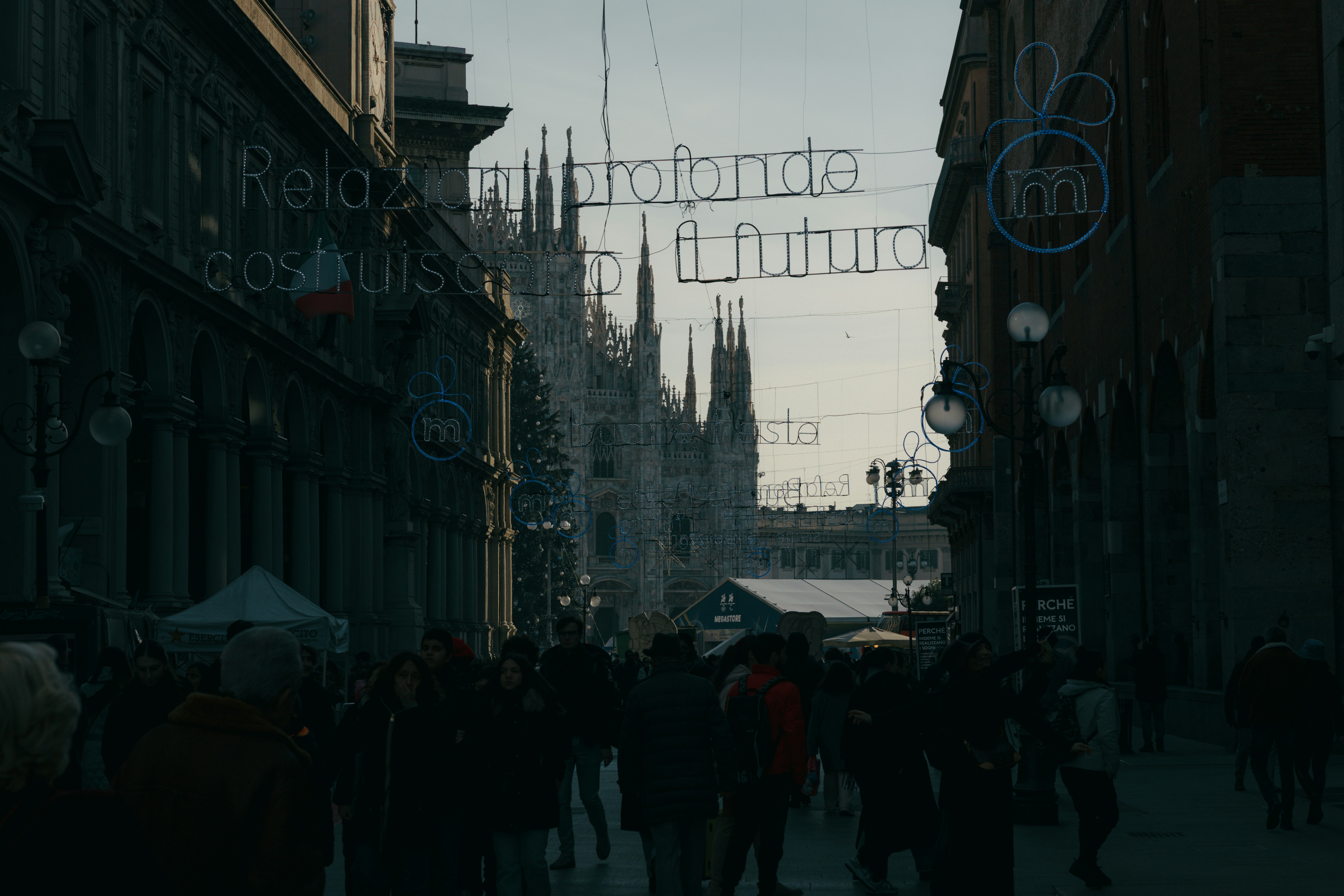 Gothic Cathedral Speaks Through the City Crowd at Dusk